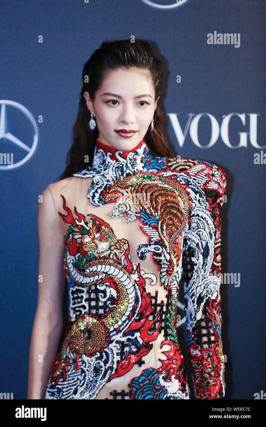 Chinese actress Zhong Chuxi poses as she arrives on the red carpet for ...