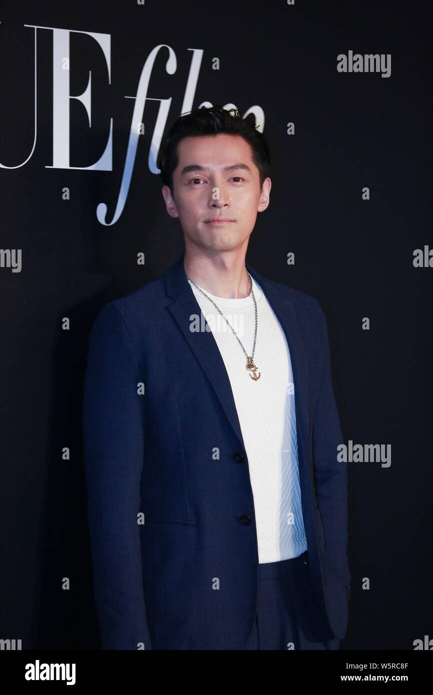 Chinese actor Hu Ge poses as he arrives on the red carpet for 2019 ...