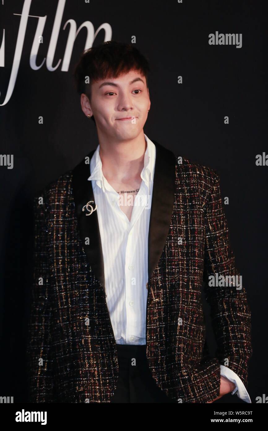 Hong Kong singer and actor William Chan poses as he arrives on the red ...