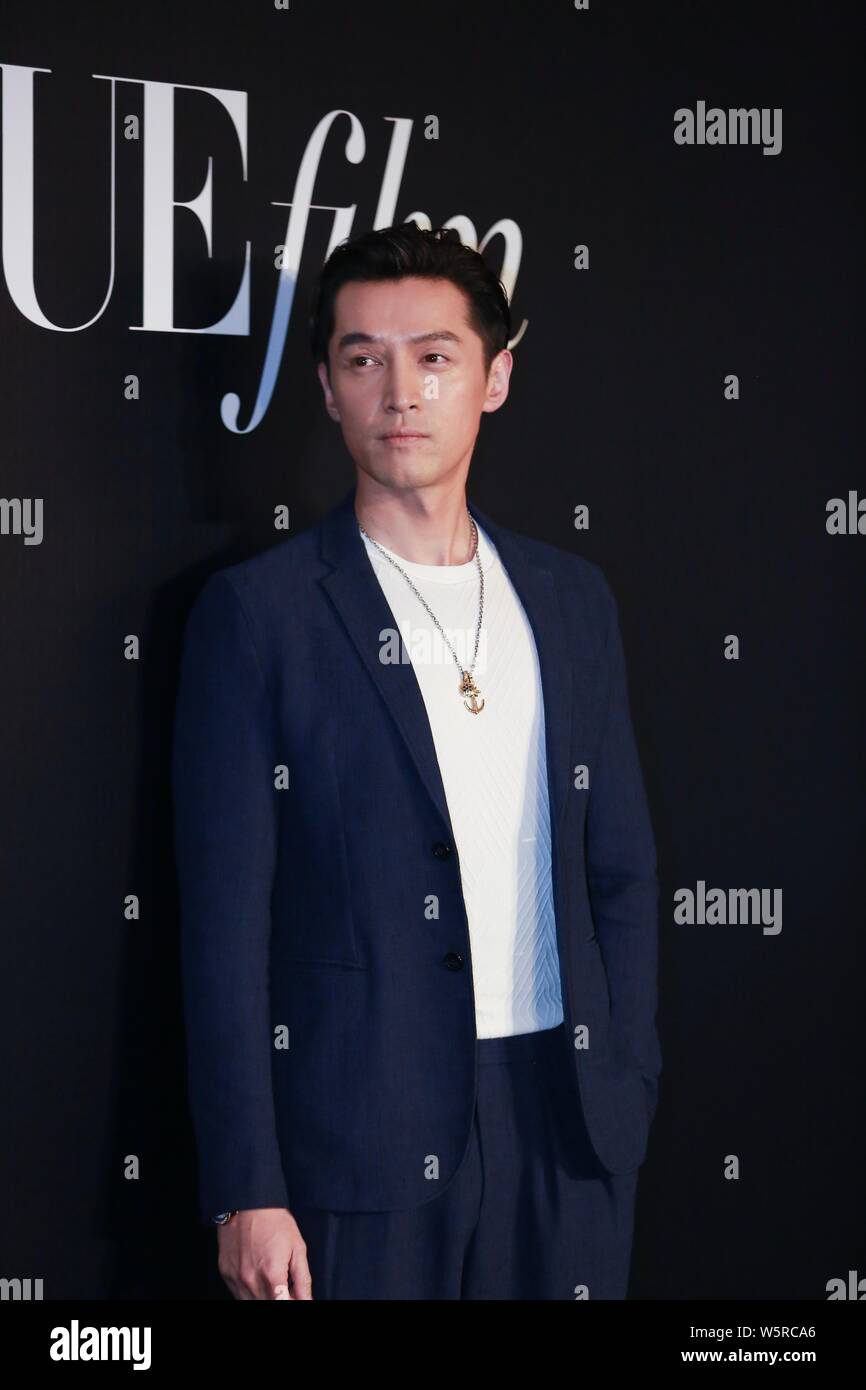 Chinese actor Hu Ge poses as he arrives on the red carpet for 2019 ...