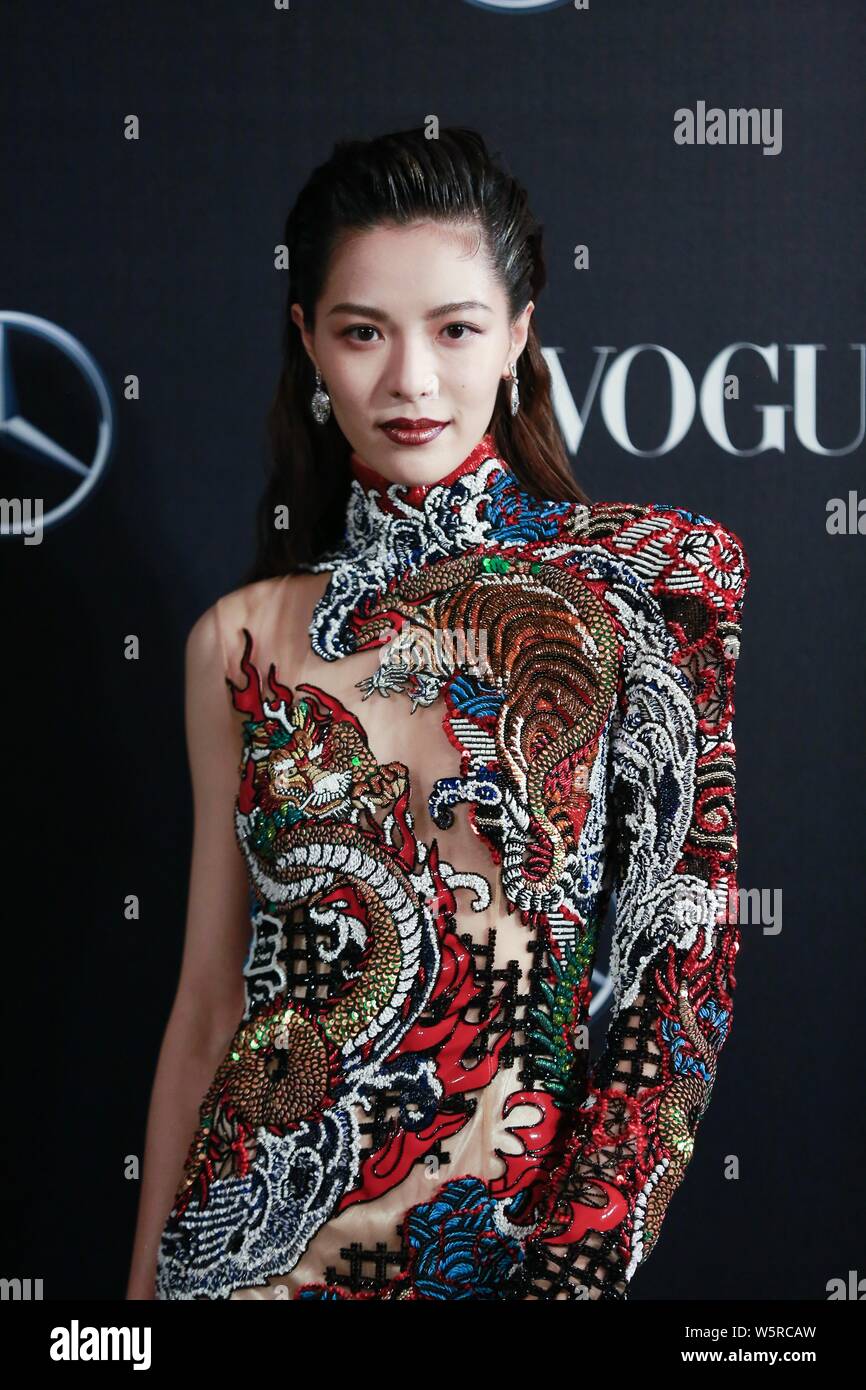 Chinese actress Zhong Chuxi poses as she arrives on the red carpet for ...