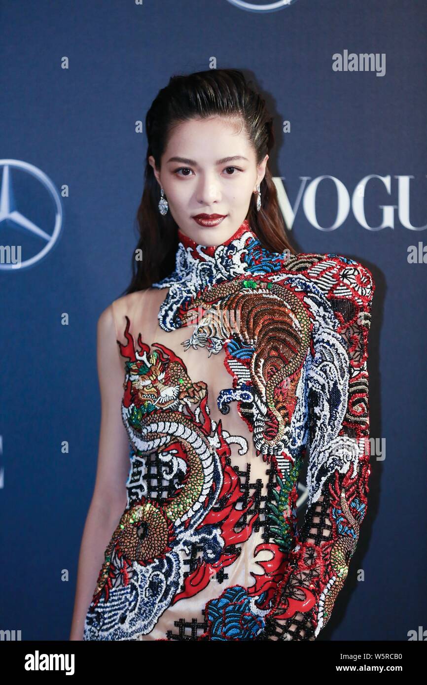 Chinese actress Zhong Chuxi poses as she arrives on the red carpet for ...