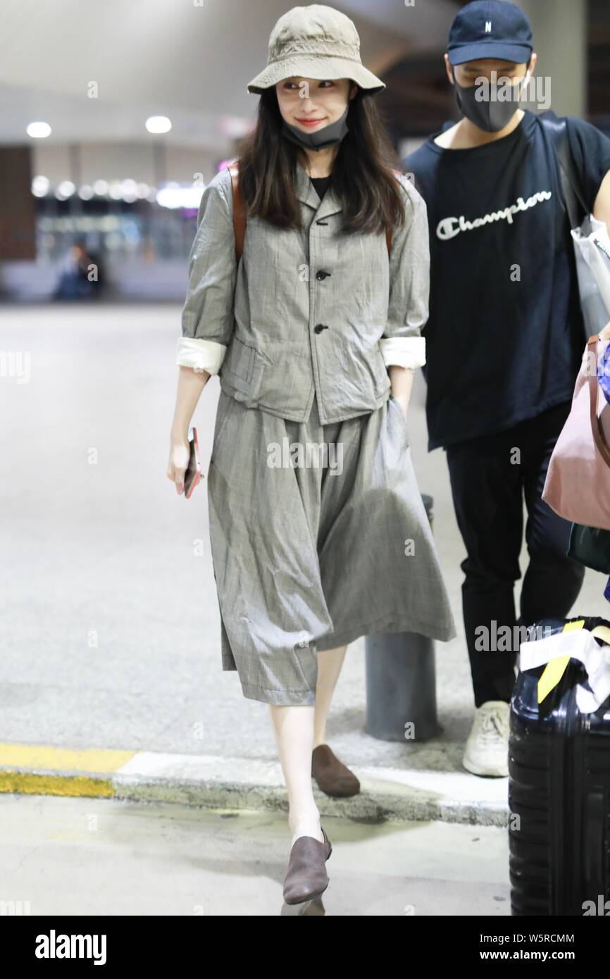 Chinese actress Ni Ni arrives at the Shanghai Hongqiao International ...