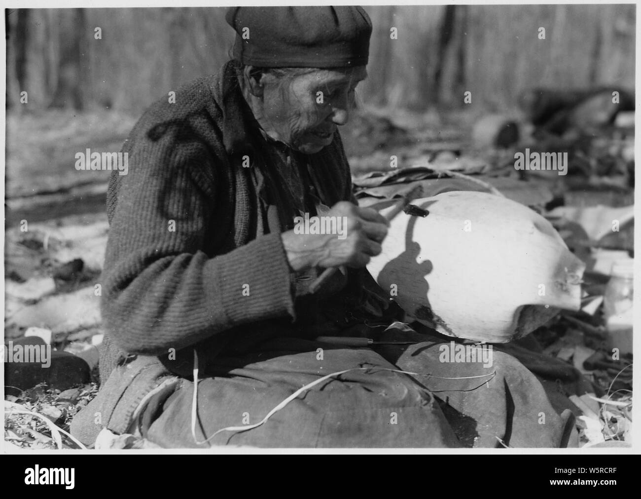 Maple sugar industry; Scope and content: Showing tent (tipi), birch ...