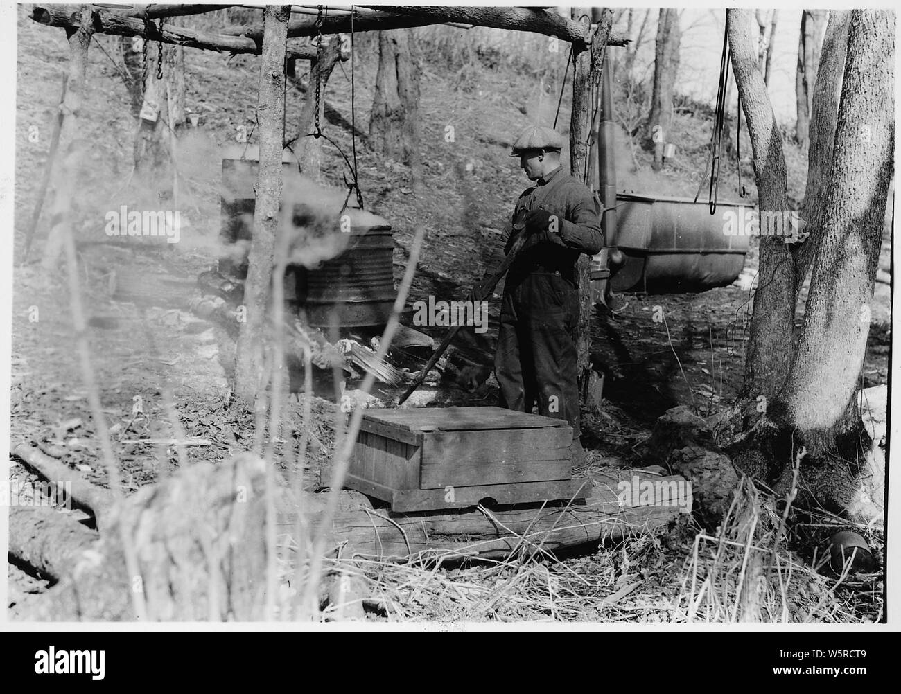 Maple sugar industry; Scope and content: Showing tent (tipi), birch ...