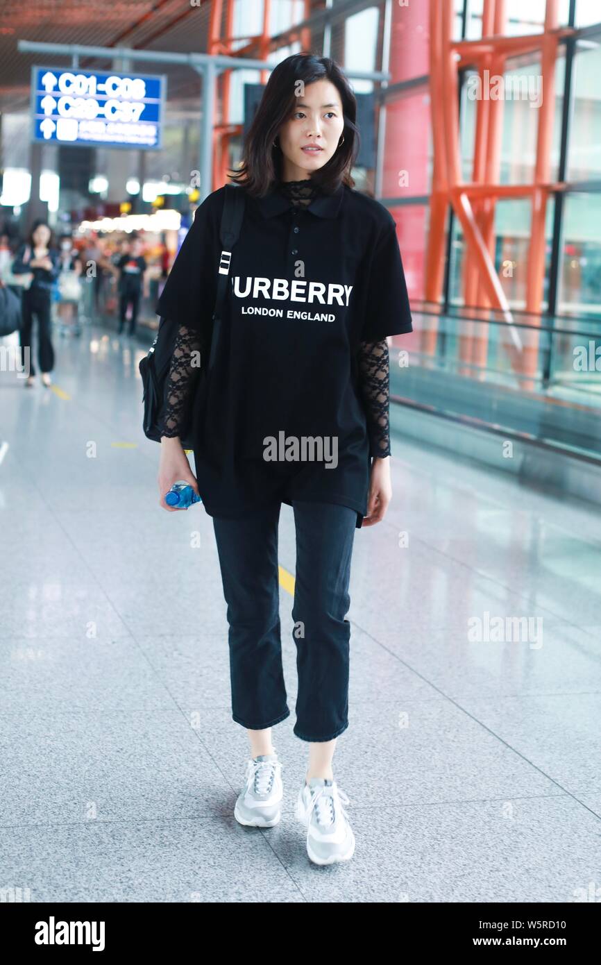 Chinese supermodel Liu Wen arrives at the Beijing Capital International ...