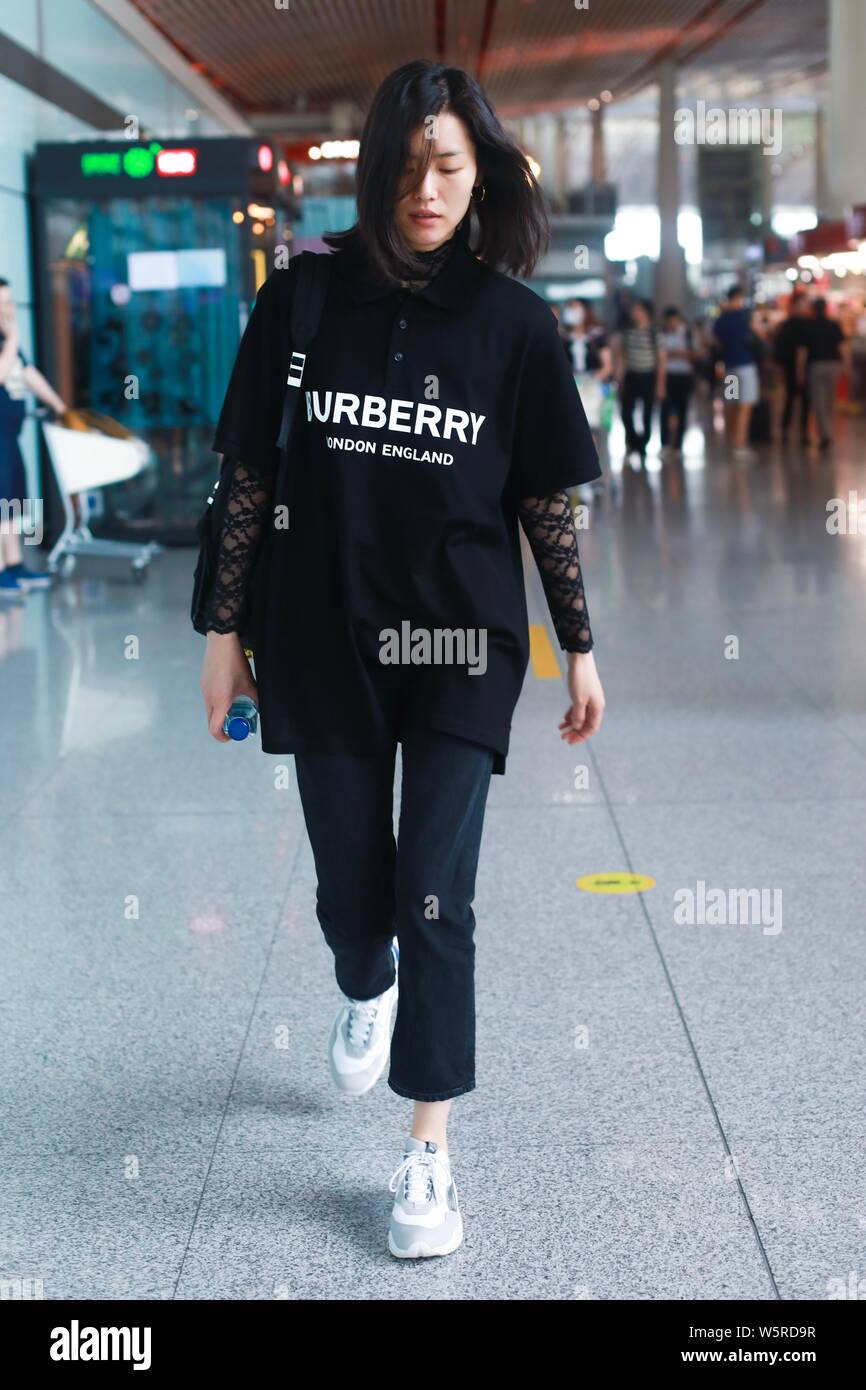 Chinese supermodel Liu Wen arrives at the Beijing Capital International ...