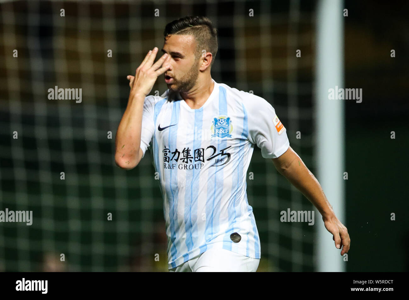 Israeli-Arab football player Dia Saba of Guangzhou R&F celebrates after ...