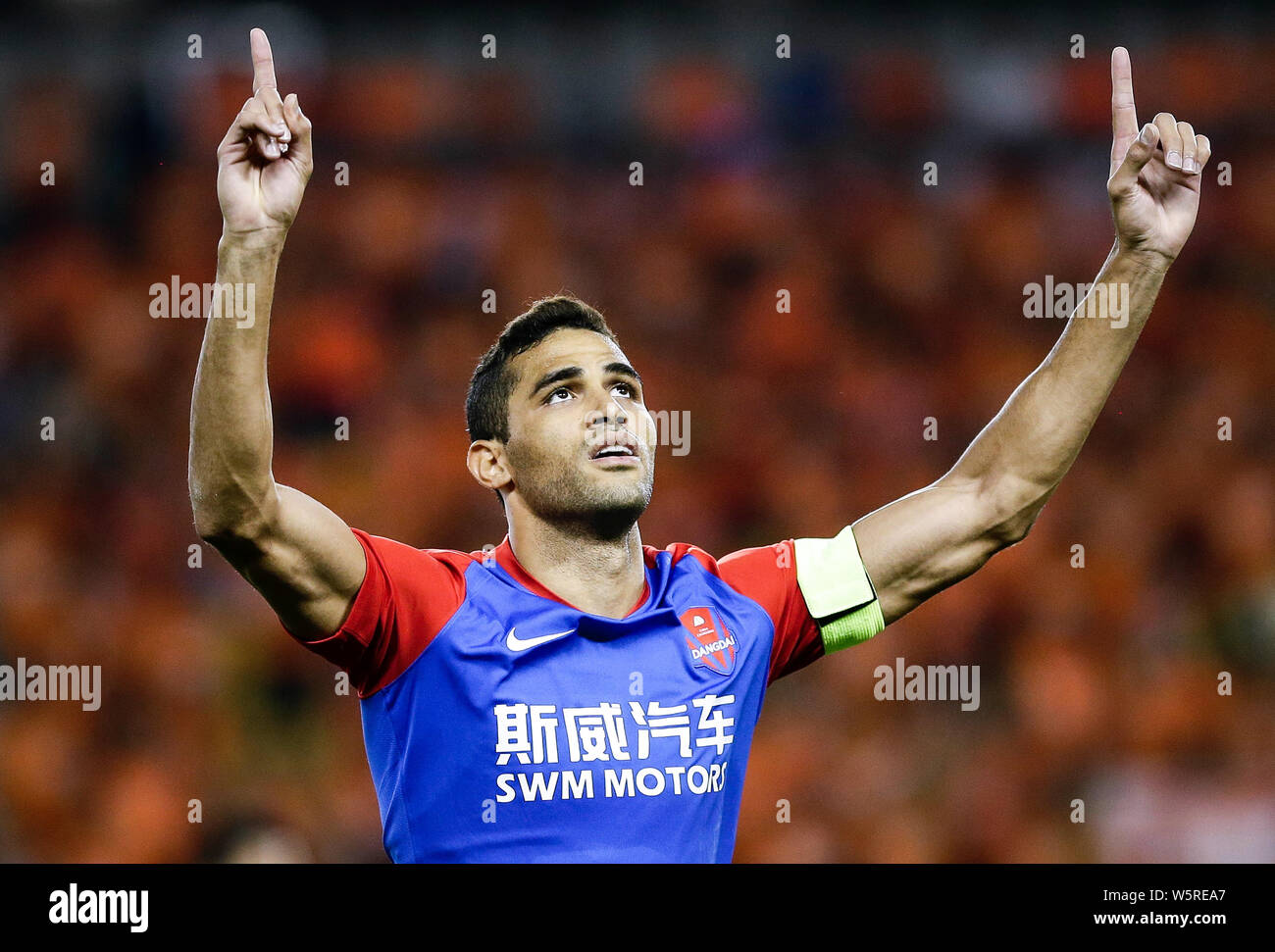 Brazilian football player Alan Kardec of Chongqing SWM celebrates after ...