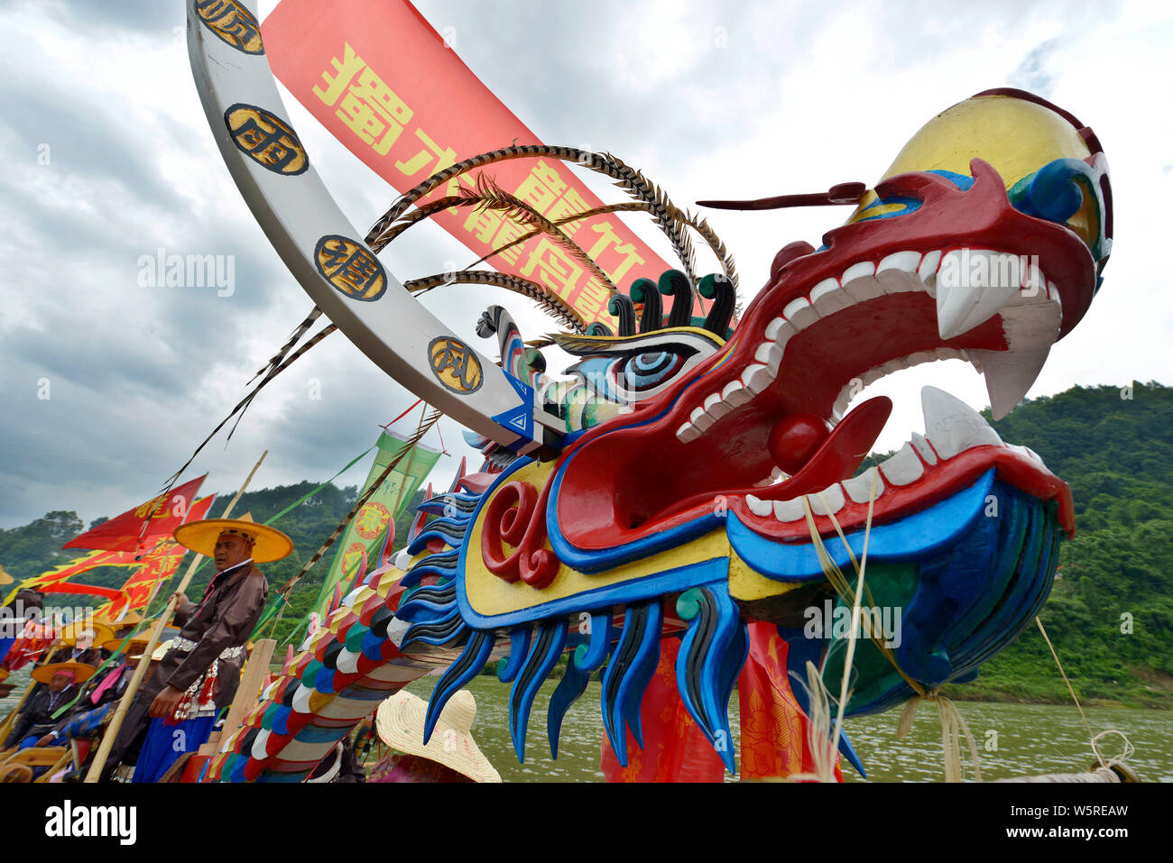 Chinese people of Miao ethnic minority take part in a dragon race ...