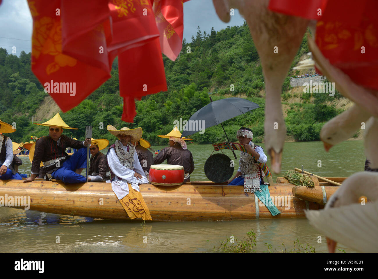 Chinese people of Miao ethnic minority take part in a dragon race ...