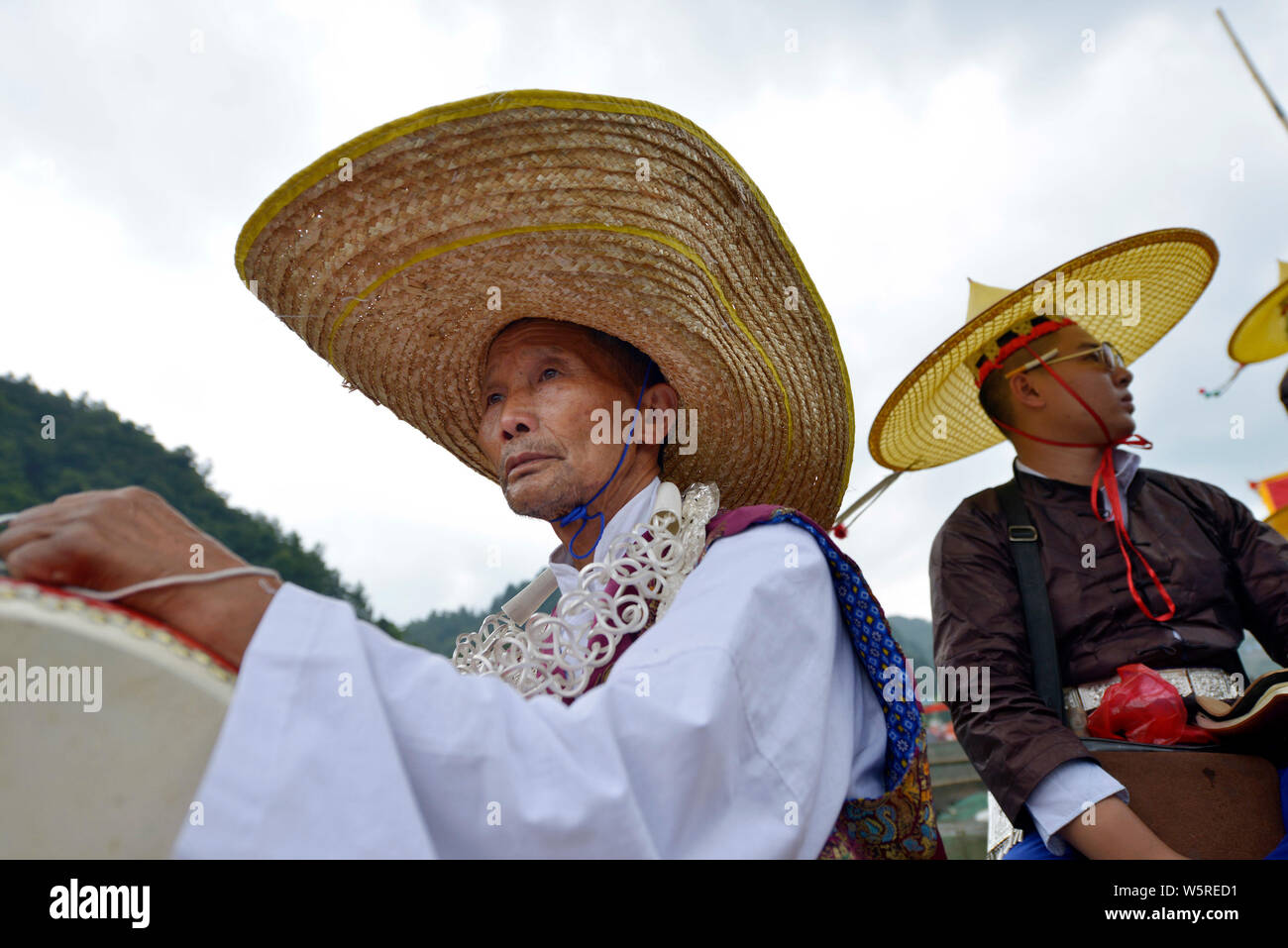 Chinese people of Miao ethnic minority take part in a dragon race ...
