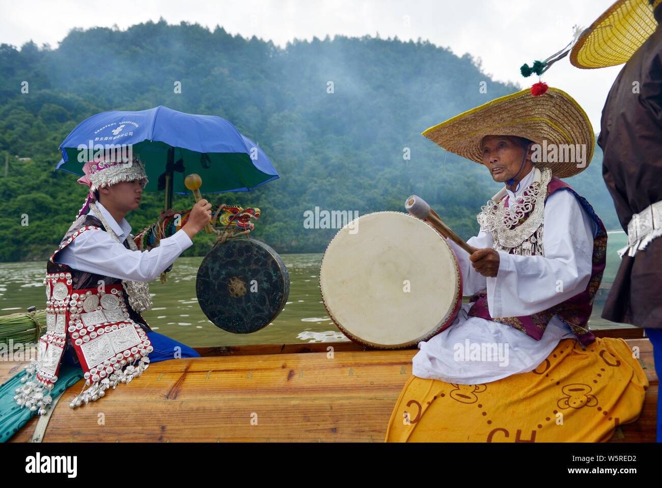 Chinese people of Miao ethnic minority take part in a dragon race ...