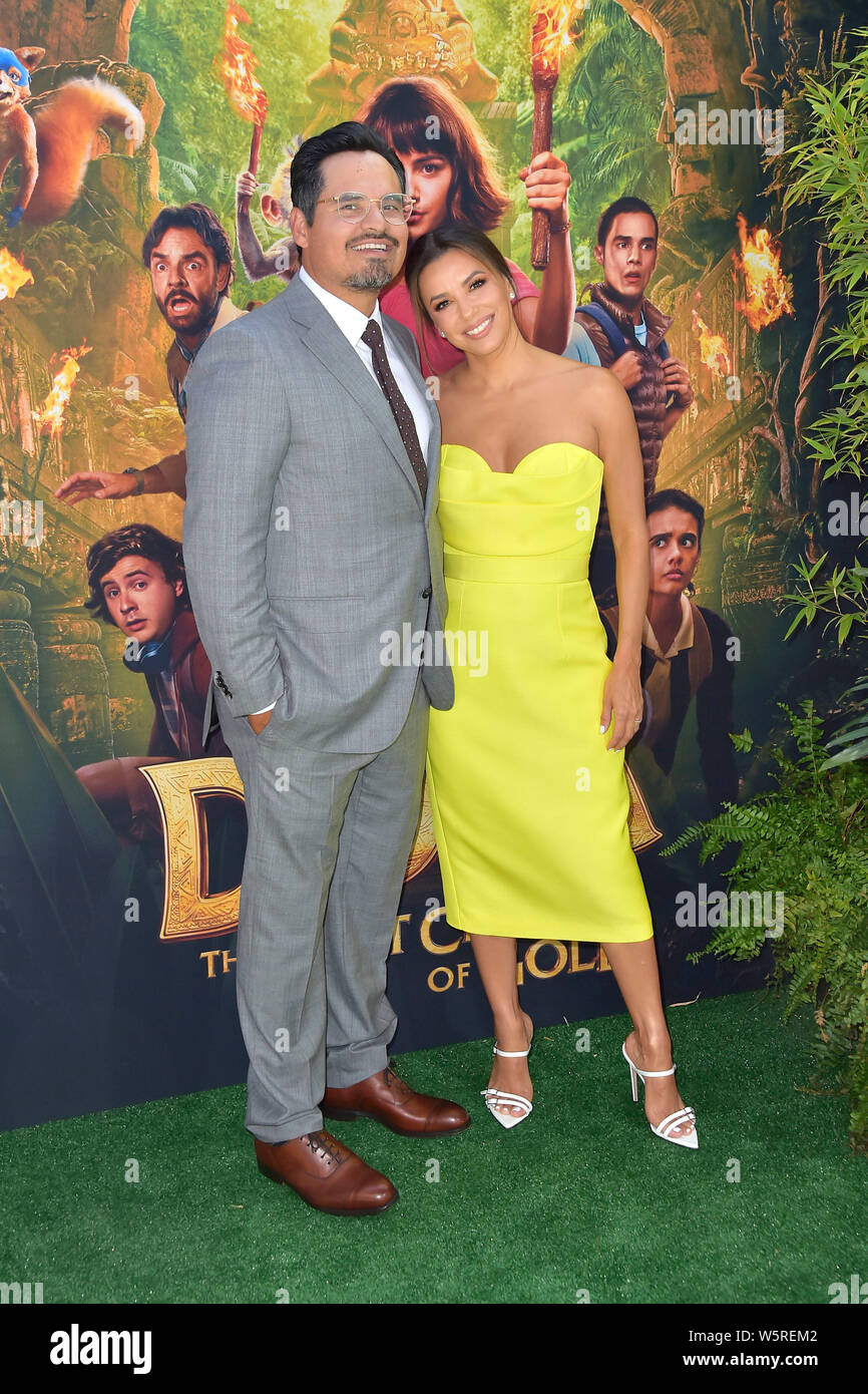 Los Angeles, USA. 28th July, 2019. Michael Pena and Eva Longoria at the ...