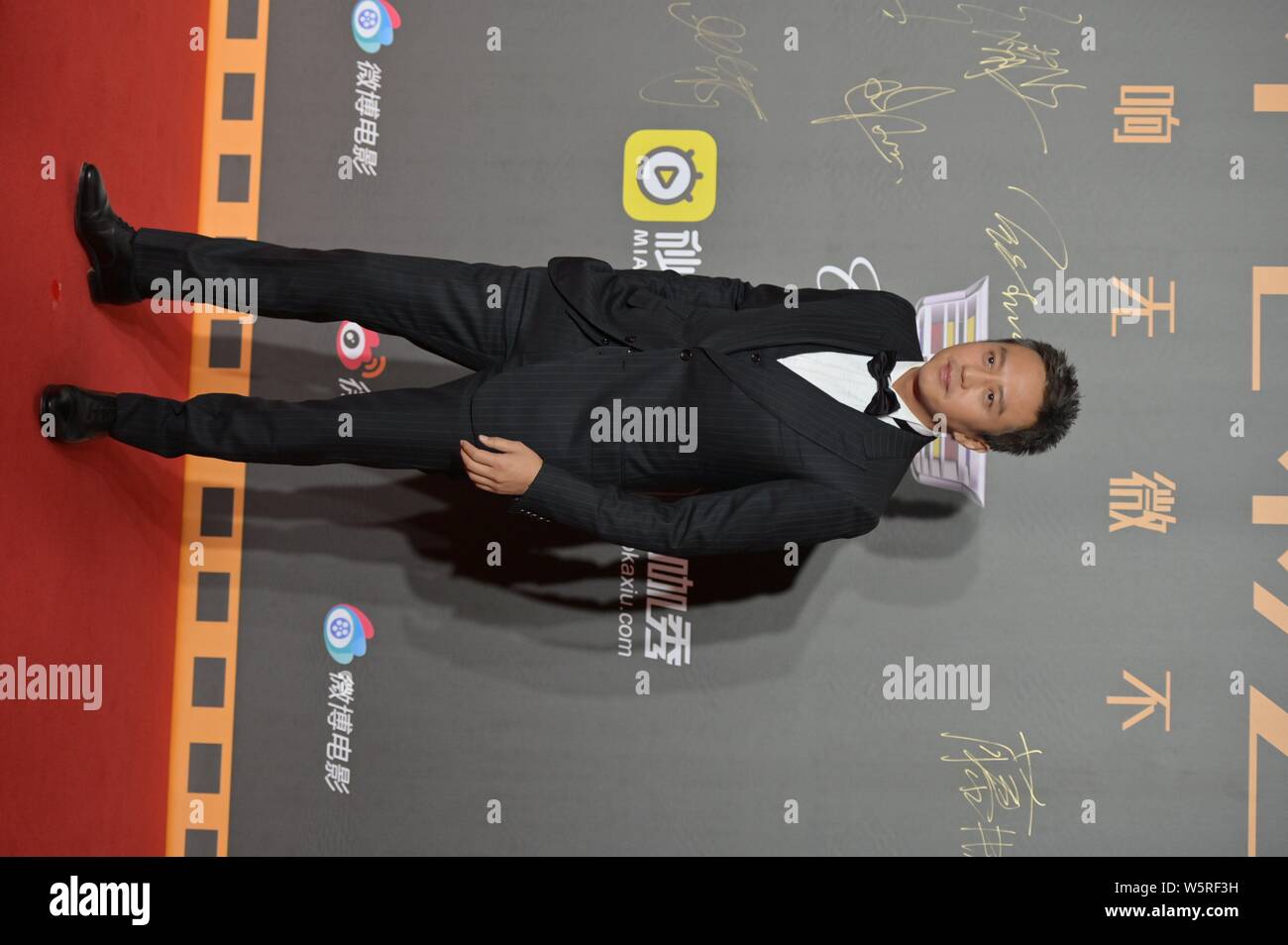 Chinese actor Deng Chao arrives on the red carpet for 2019 Sina Weibo ...
