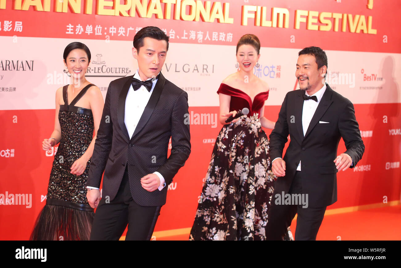 Chinese actors Hu Ge, left, and Liao Fan arrive on the red carpet for ...
