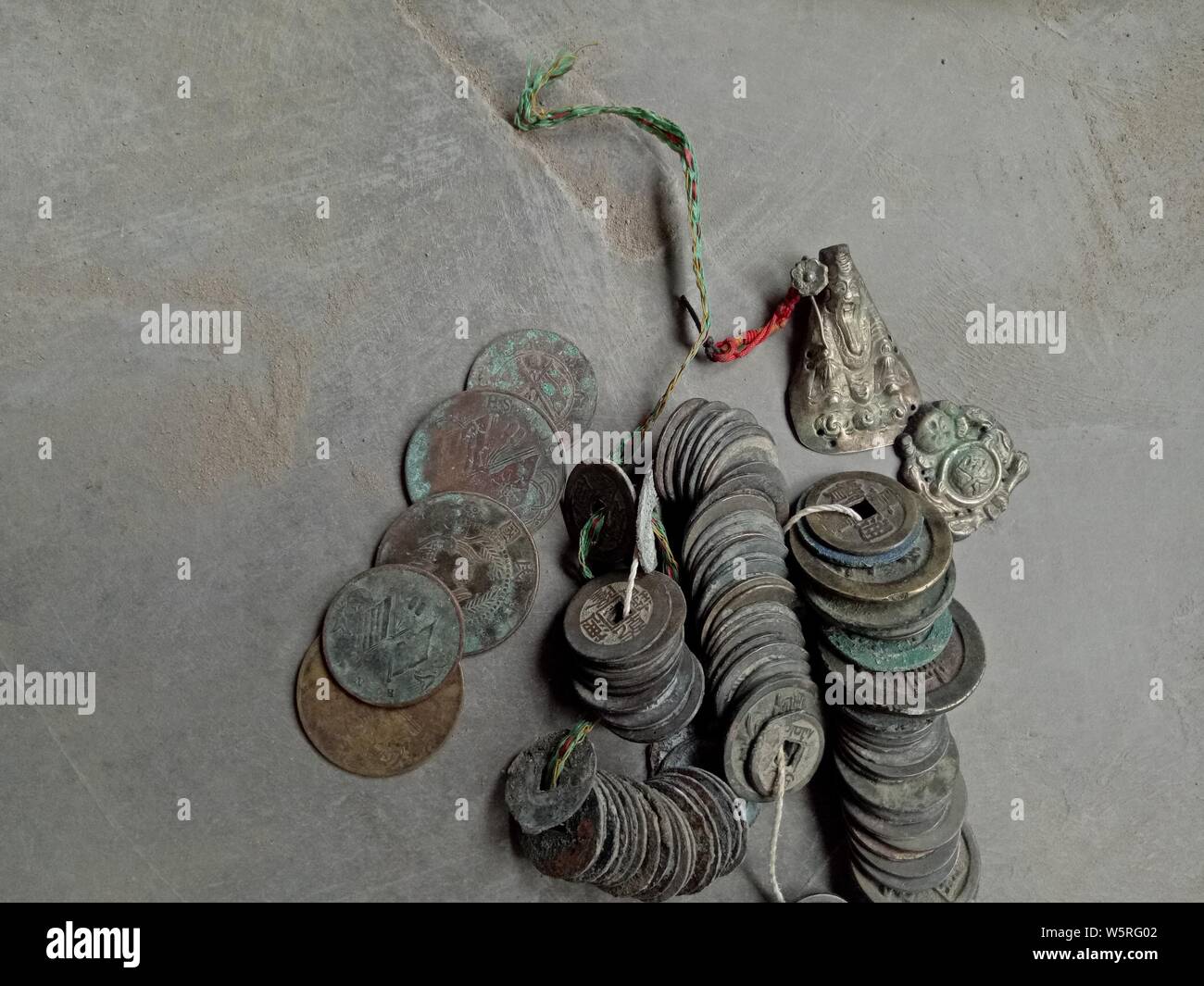 Chinese ninety-seven-year-old woman Zhang Sulan shows her dowry at home ...