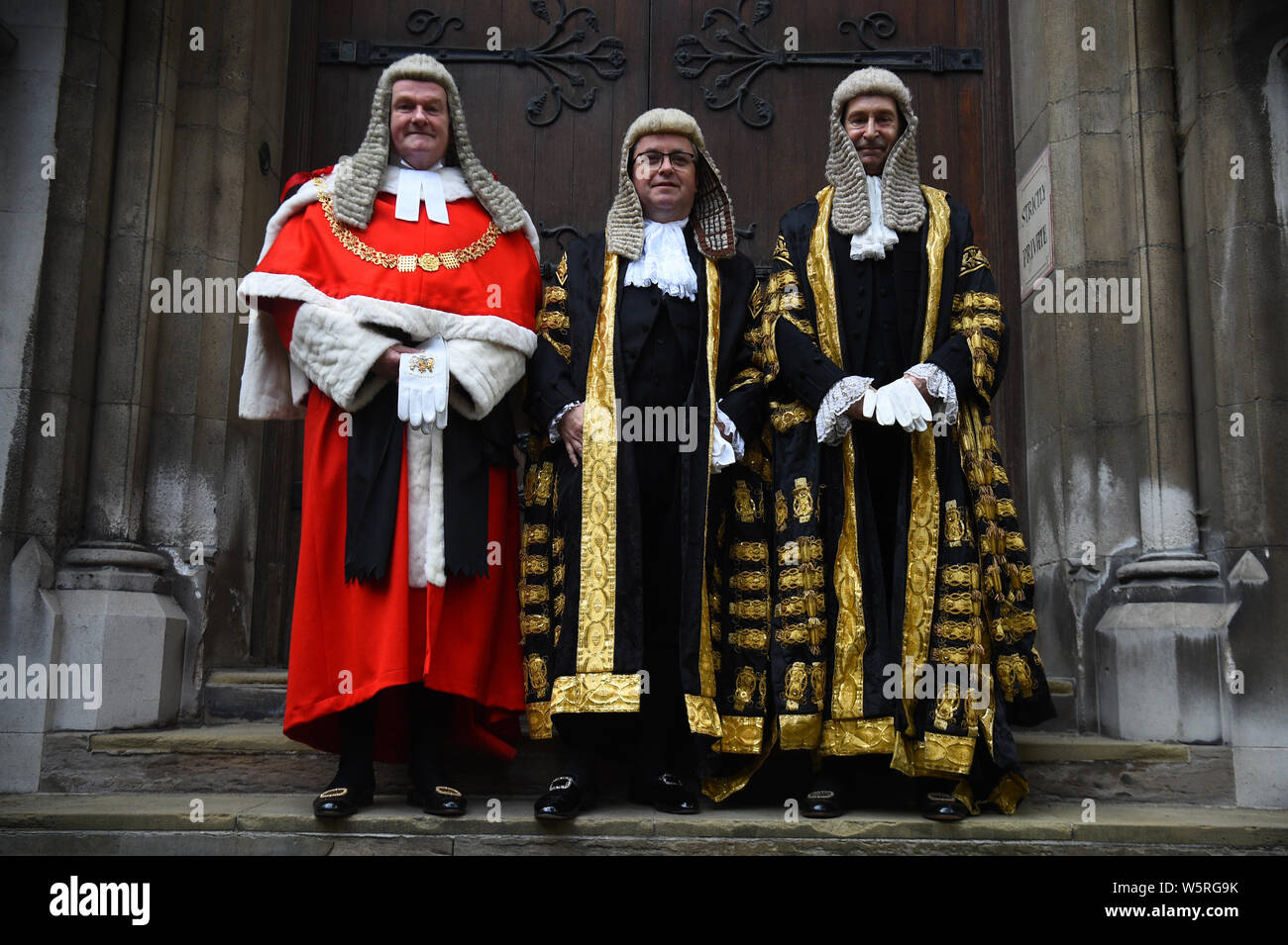 Robert Buckland QC (centre) poses for a photo with the Lord Chief ...