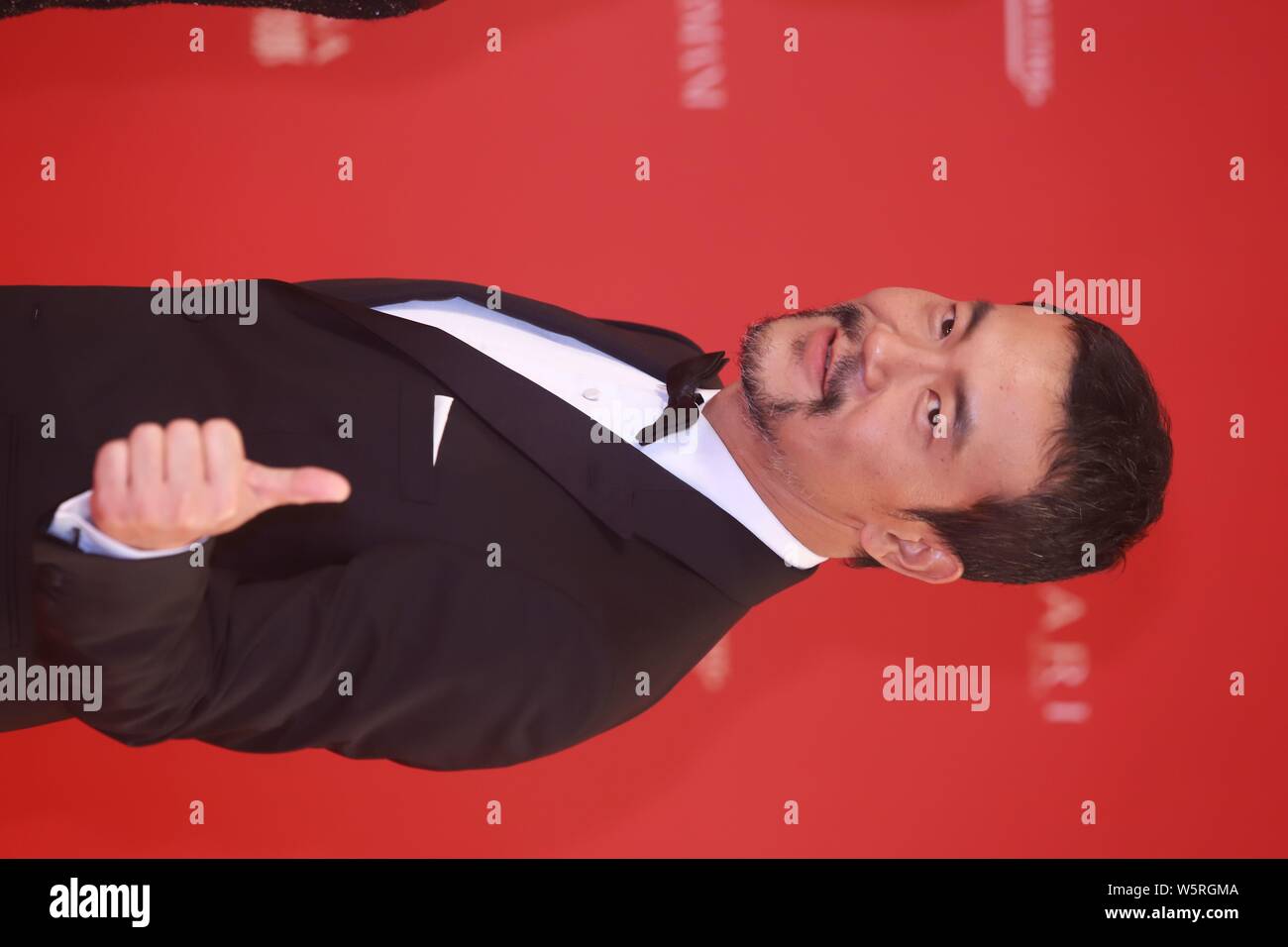 Chinese actor Liao Fan arrives on the red carpet for the opening ...