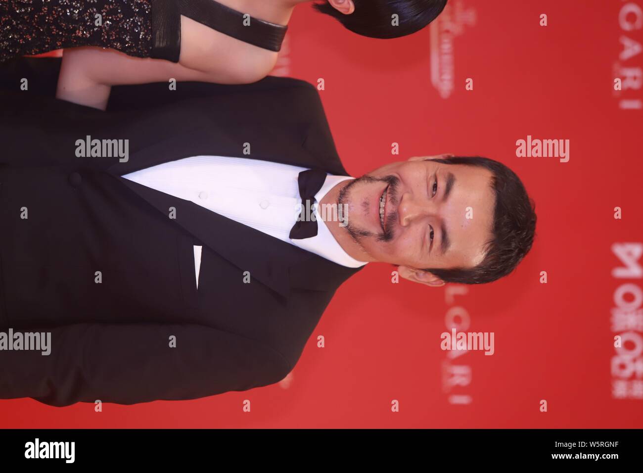 Chinese actor Liao Fan arrives on the red carpet for the opening ...
