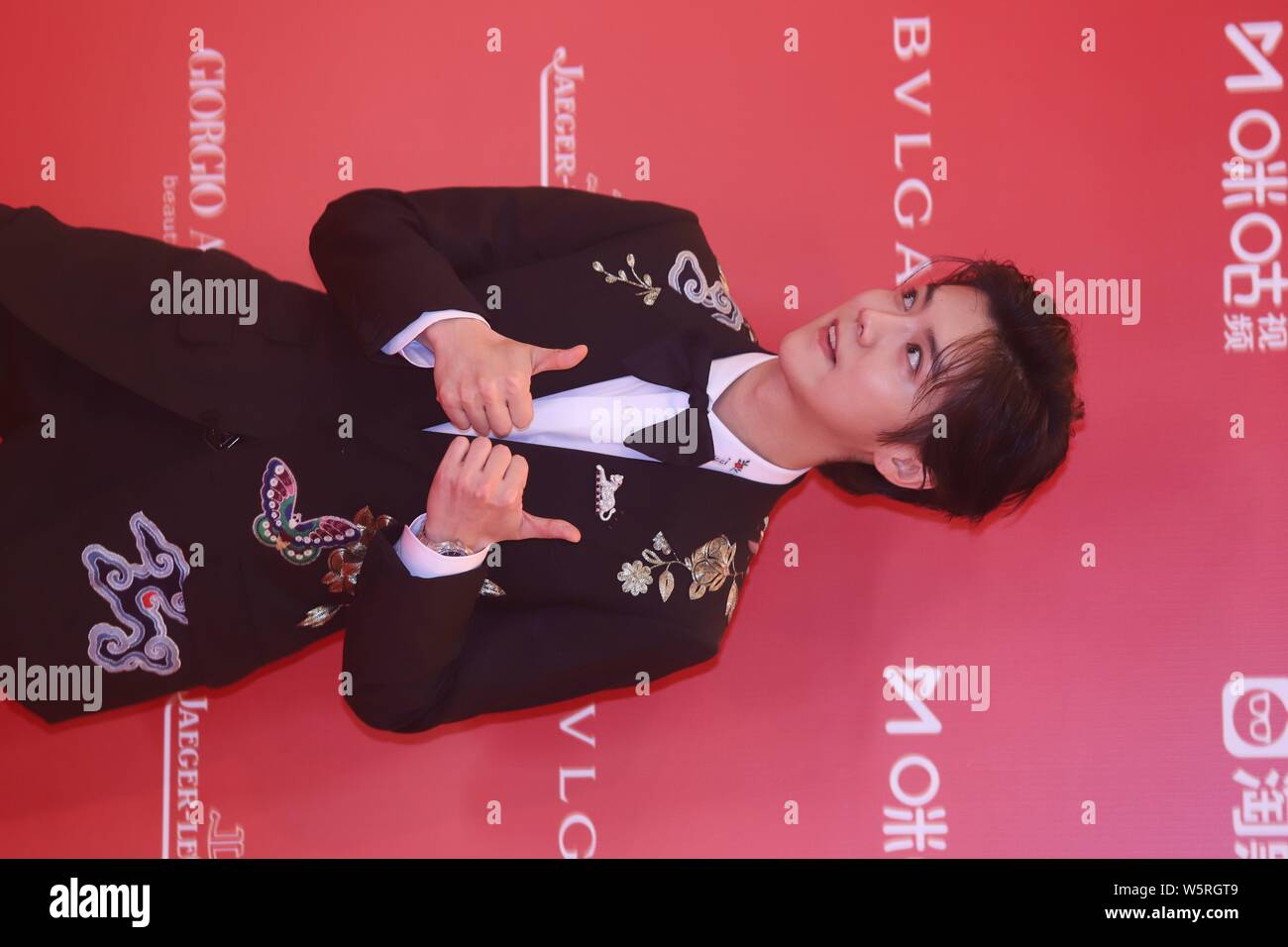 Chinese singer and actor Lu Han arrives on the red carpet for the ...