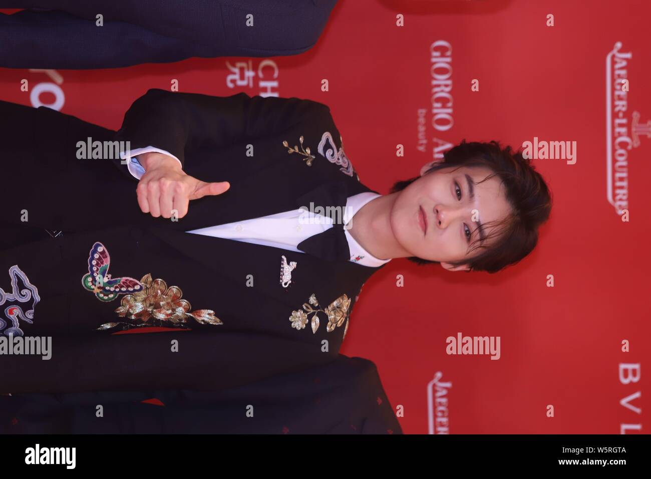 Chinese singer and actor Lu Han arrives on the red carpet for the ...