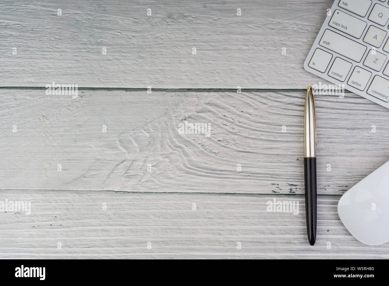 Flat lay, top view office table desk. Workspace with mouse, pen and ...