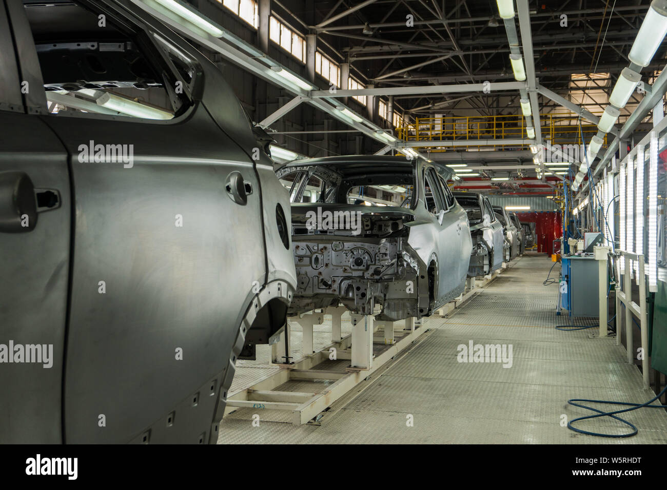 Car body on the production line. Car production. Modern technologies at ...