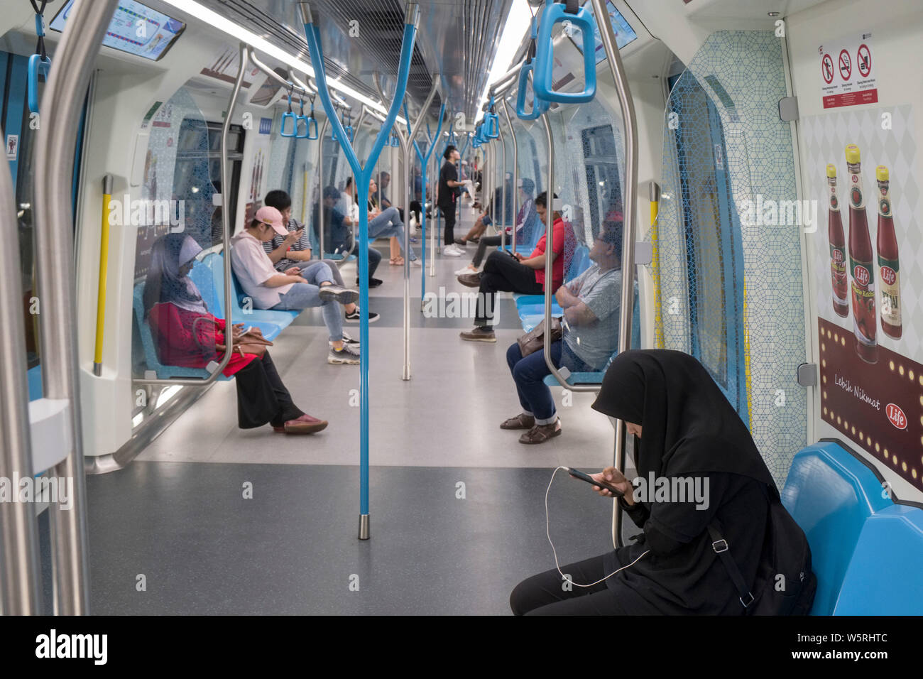 Malaysia, Kuala Lumpur: inside view of a metro train Stock Photo - Alamy