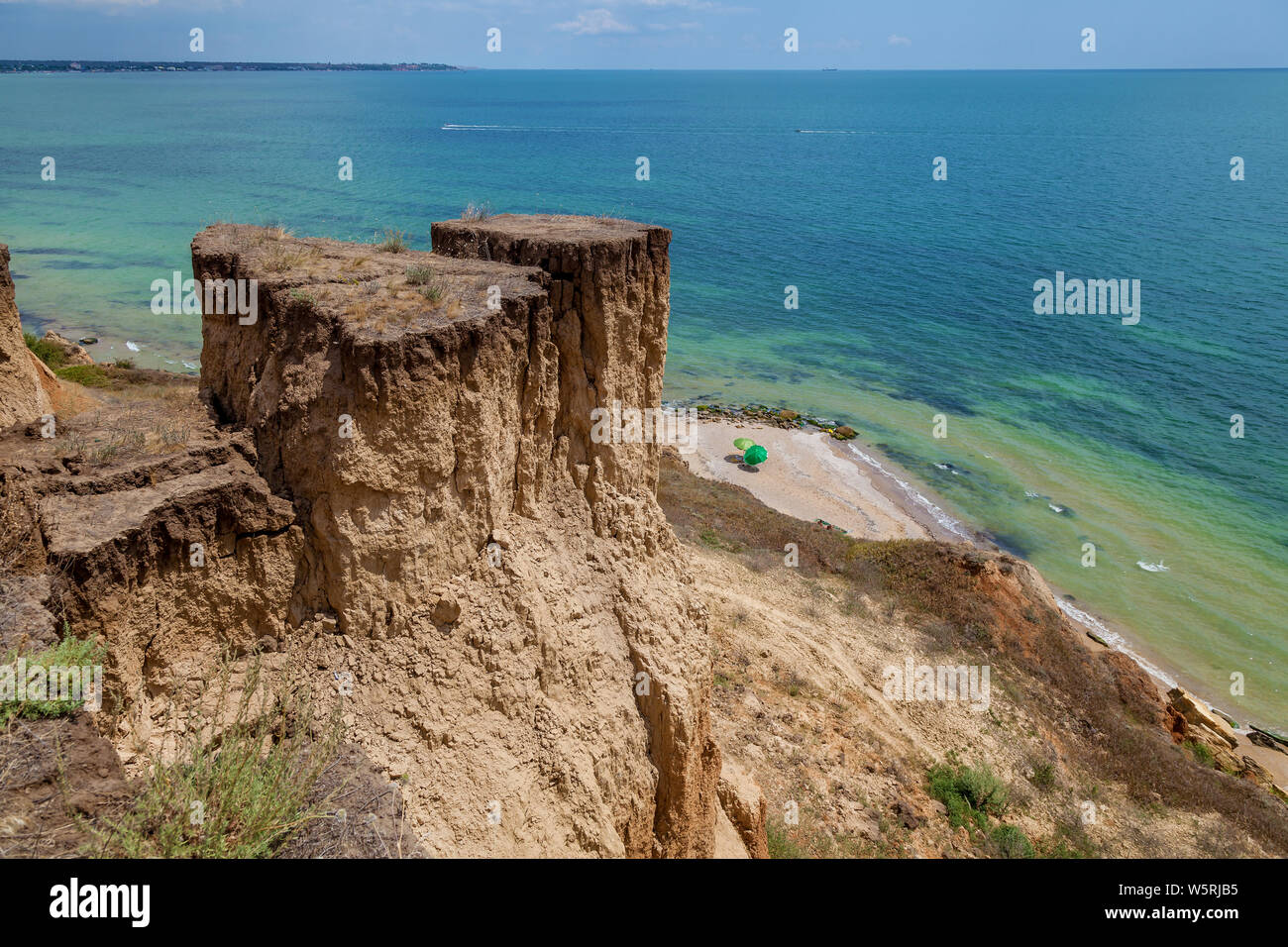 Yellow sandy rocks and stones of various forms on the Black Sea coast ...