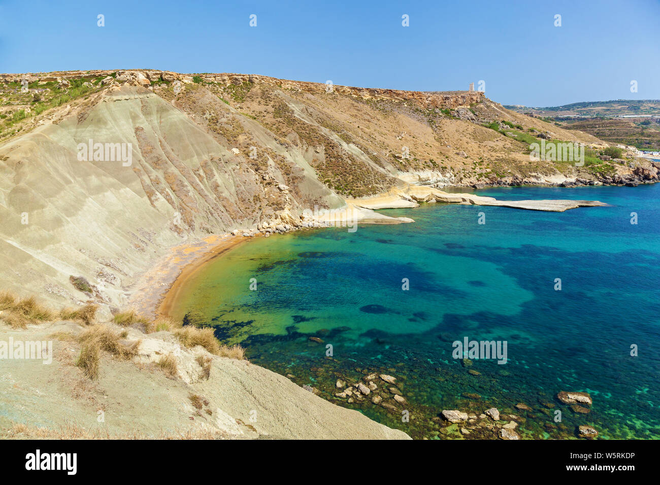 Maltese beach. Seashore of Malta. Ghajn tuffieha bay in summer ...