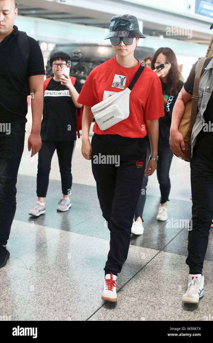 Chinese singer Chris Lee or Li Yuchun arrives at the Beijing Capital ...