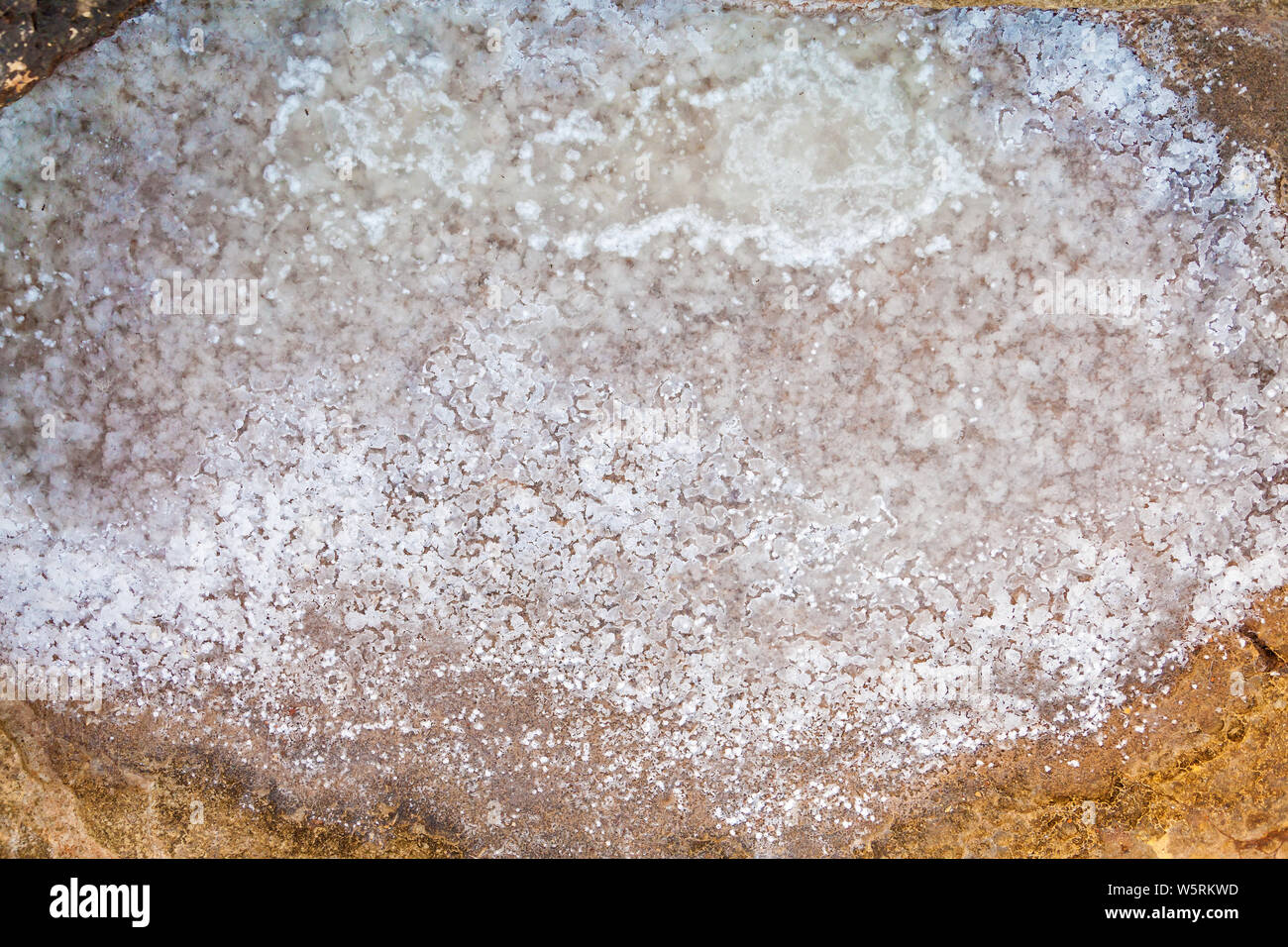 Extraction of sea salt from the evaporation of seawater in stone pools ...