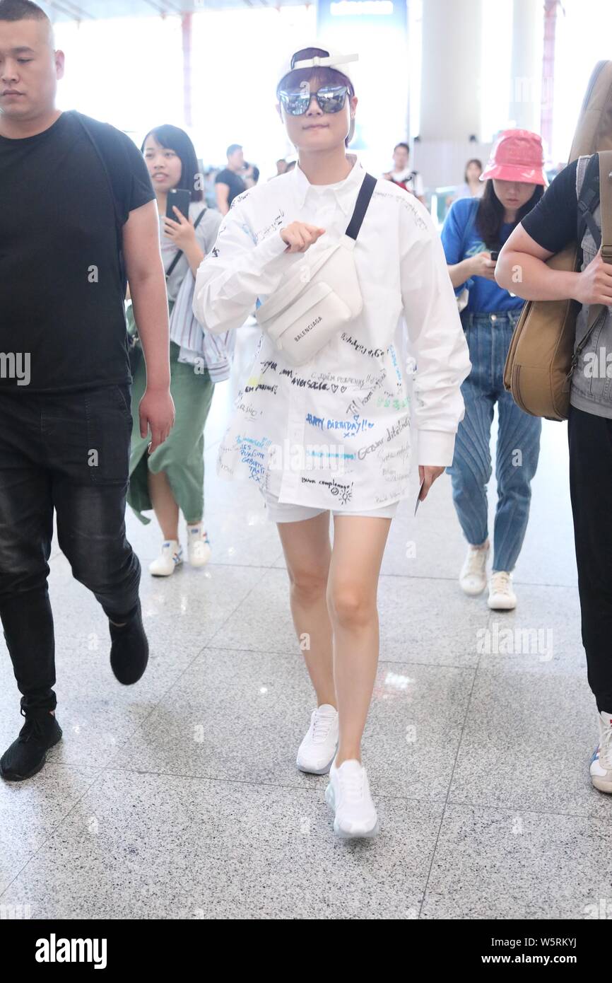 Chinese singer Chris Lee or Li Yuchun arrives at the Beijing Capital ...