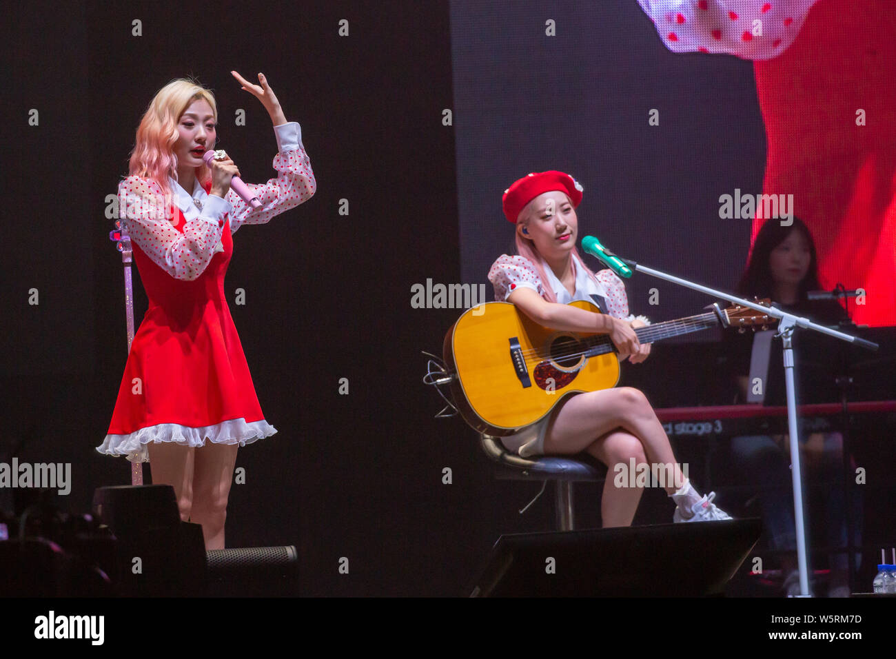 Ahn Ji-young and Woo Ji-yoon of South Korean duo Bolbbalgan4 perform ...