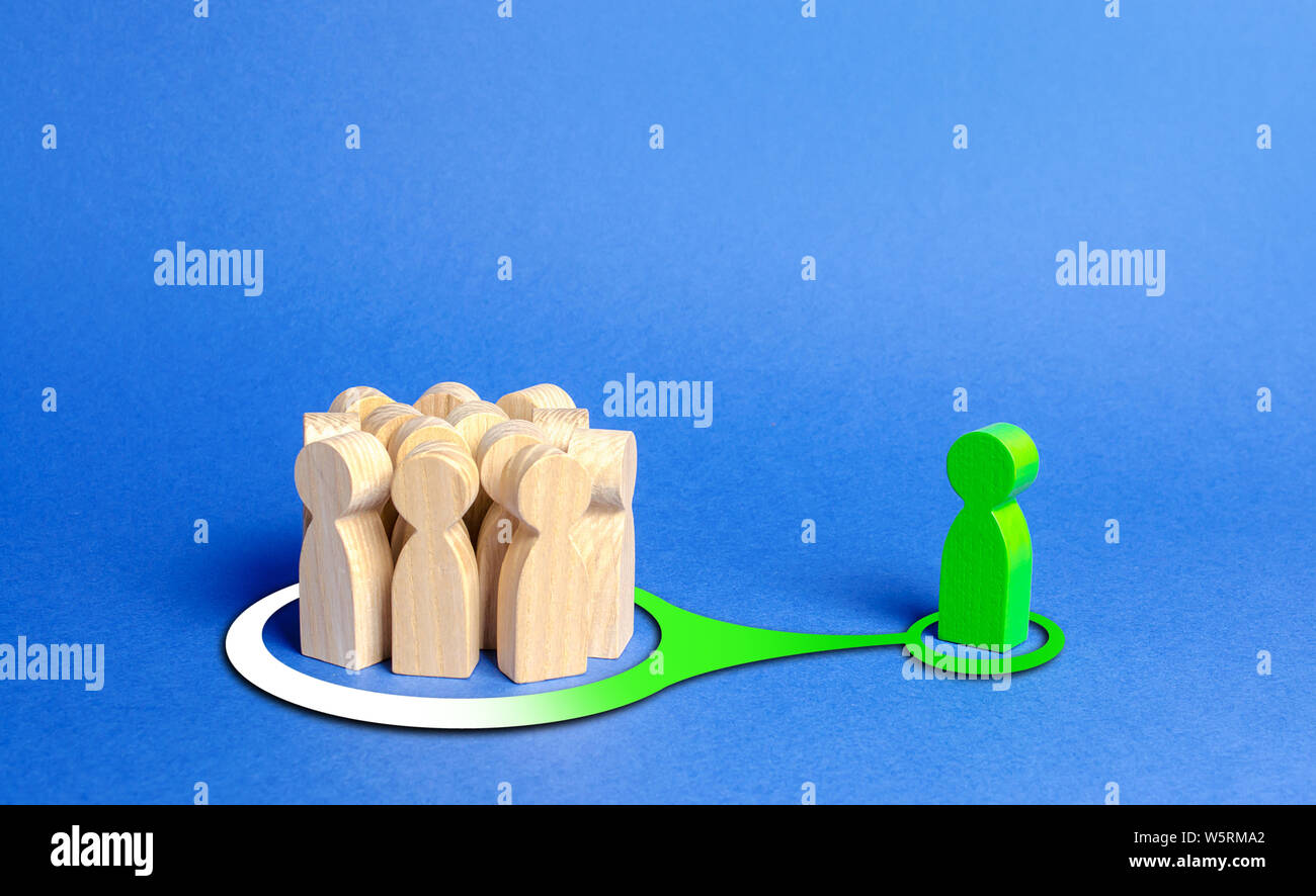 A green human figure influences on a crowd of people. presentation of a ...