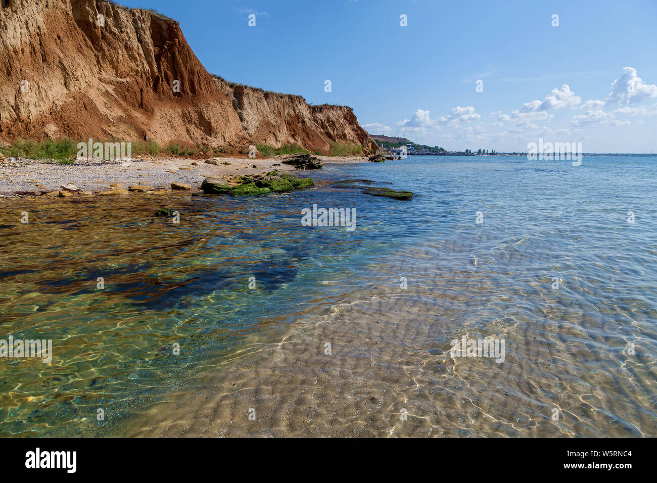 Yellow sandy rocks and stones of various forms on the Black Sea coast ...