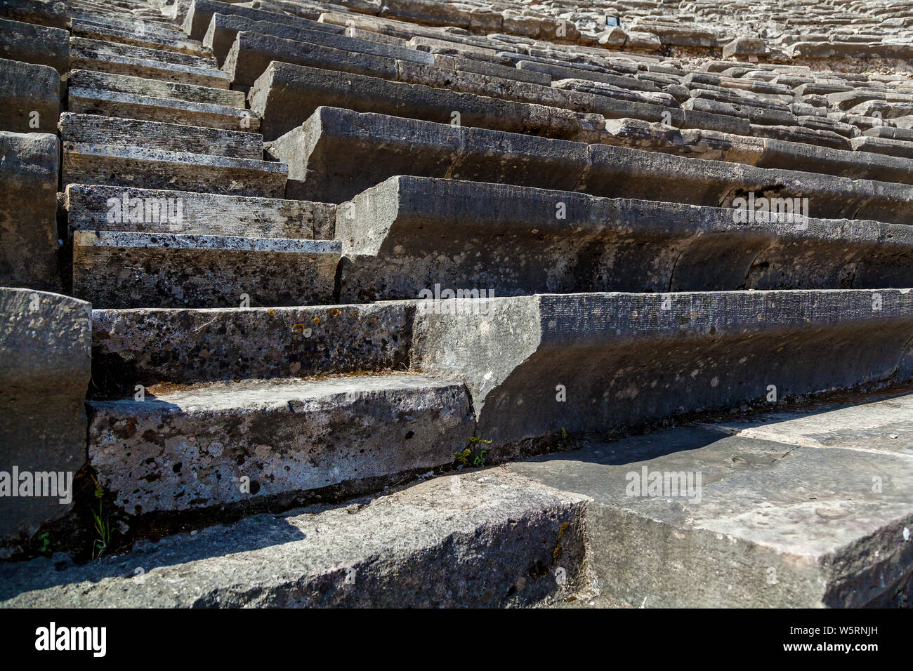 Stone steps of an old amphitheater from ancient times in the region of ...