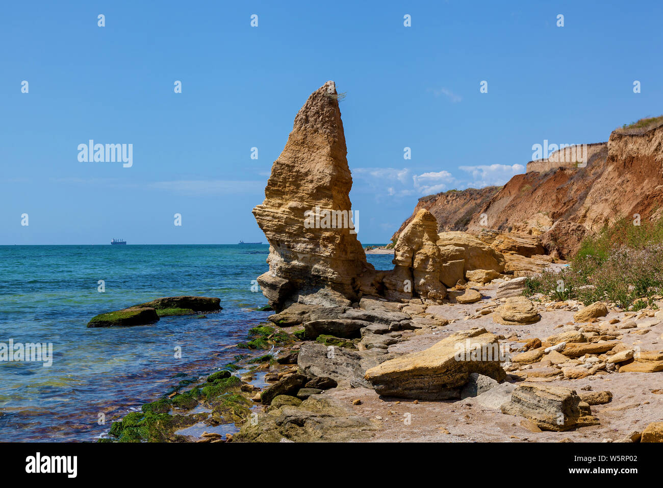 Yellow sandy rocks and stones of various forms on the Black Sea coast ...