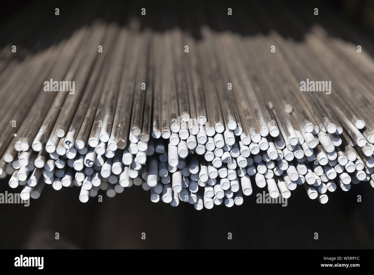 steel metal bars on pile, close up Stock Photo - Alamy