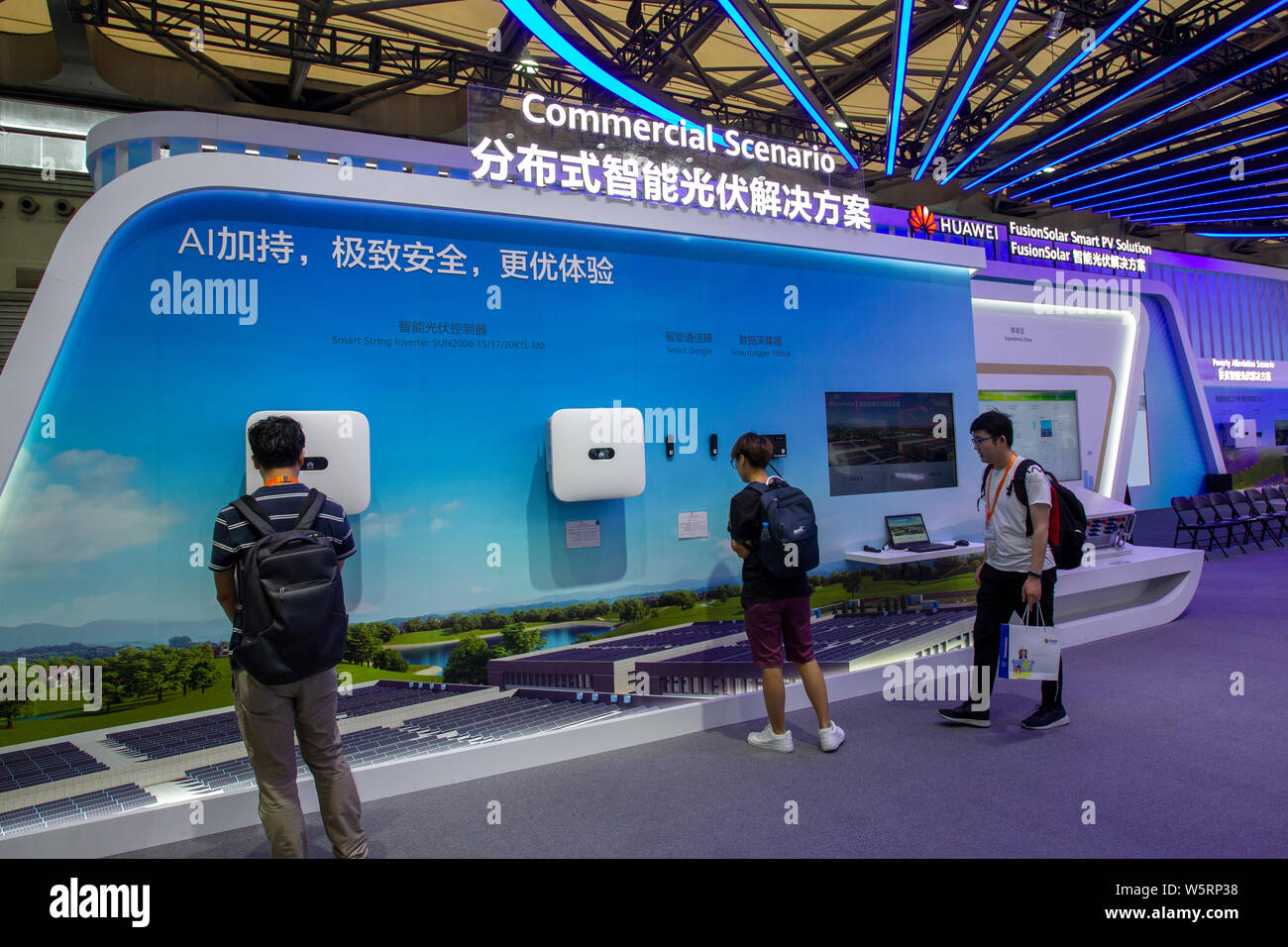 --FILE--People visit the stand of Huawei during an expo in Shanghai ...