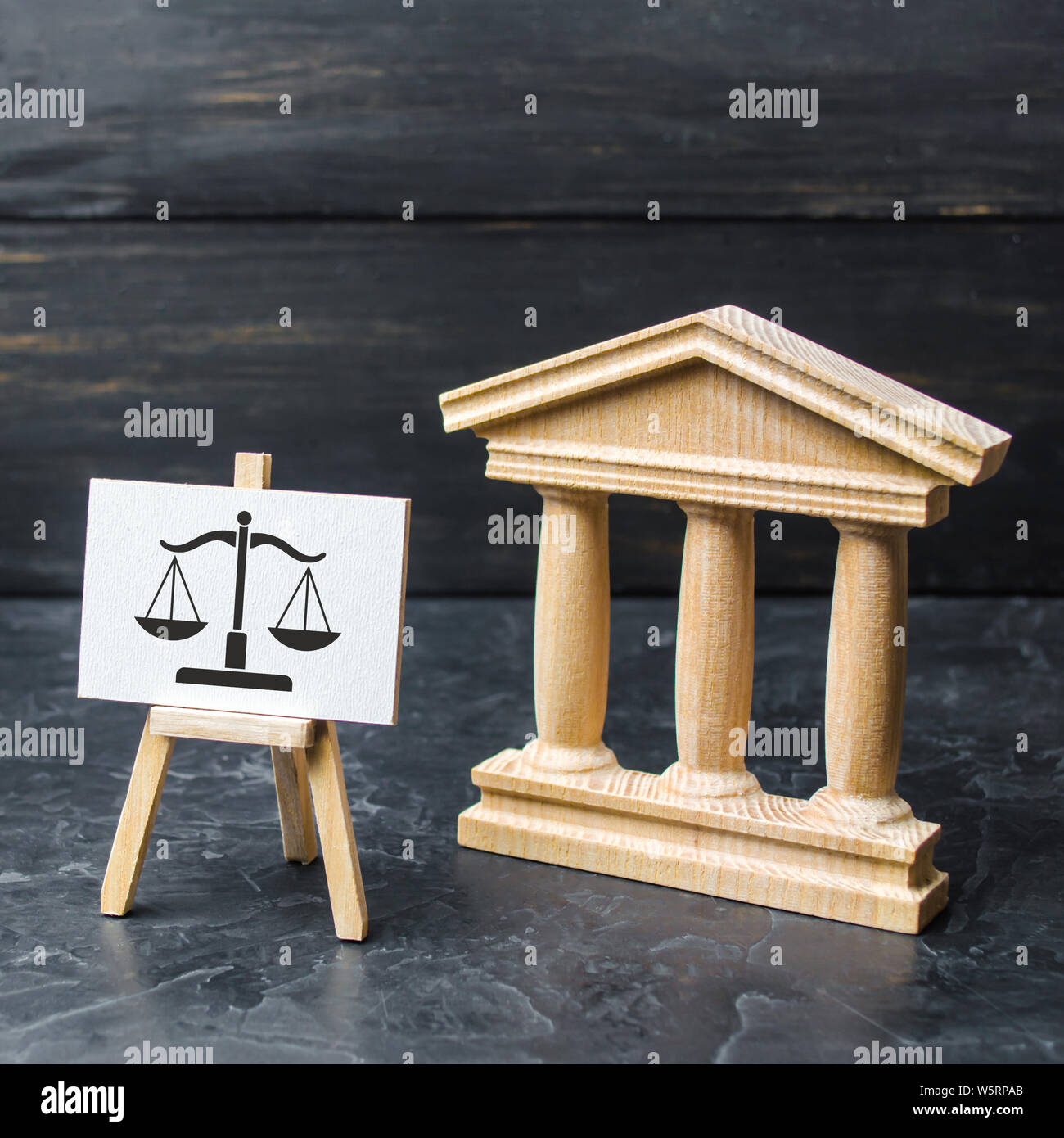 Courthouse and a sign with scales. The concept of the court and the ...