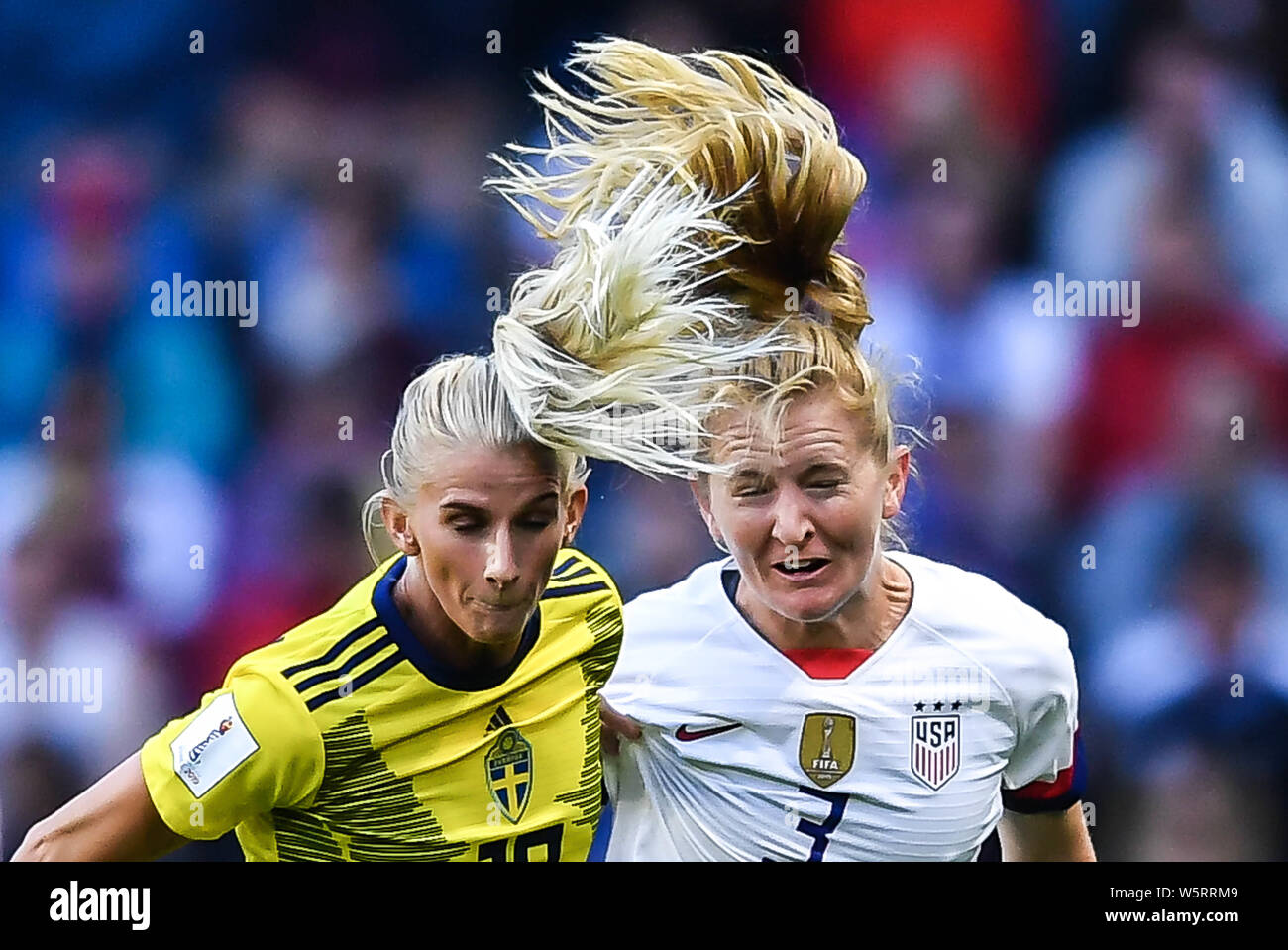 Sam Mewis, right, of United States women's national soccer team heads ...