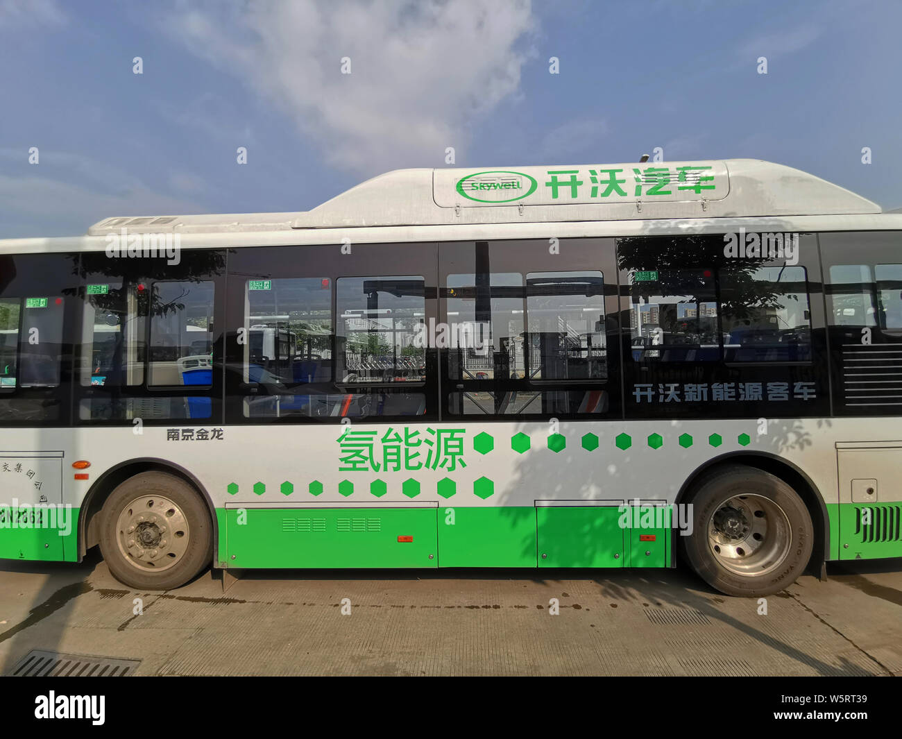 A hydrogen fuel-cell bus is parked at a local bus station in Wuhan city ...