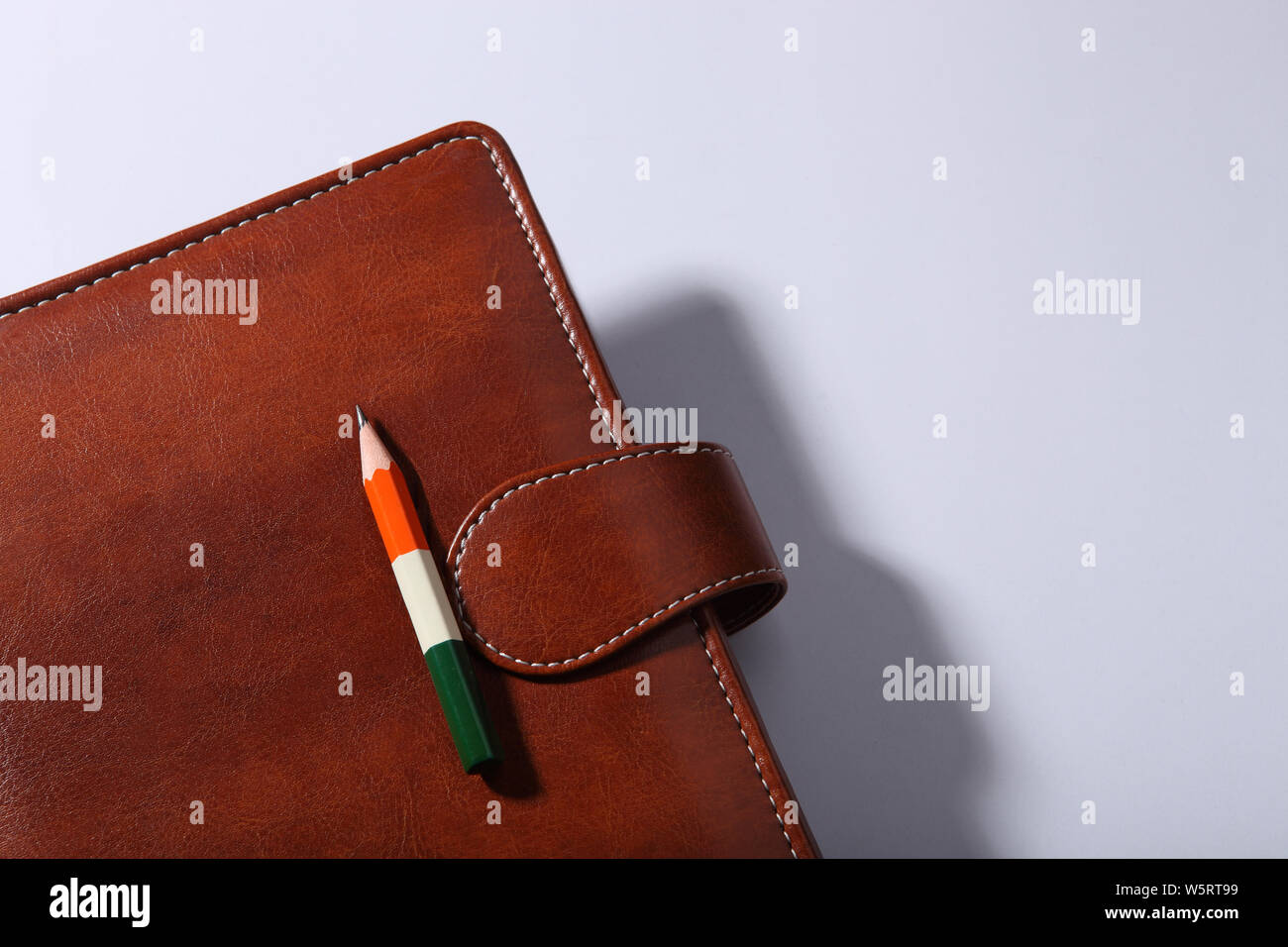 Close up of diary with pencil Stock Photo - Alamy