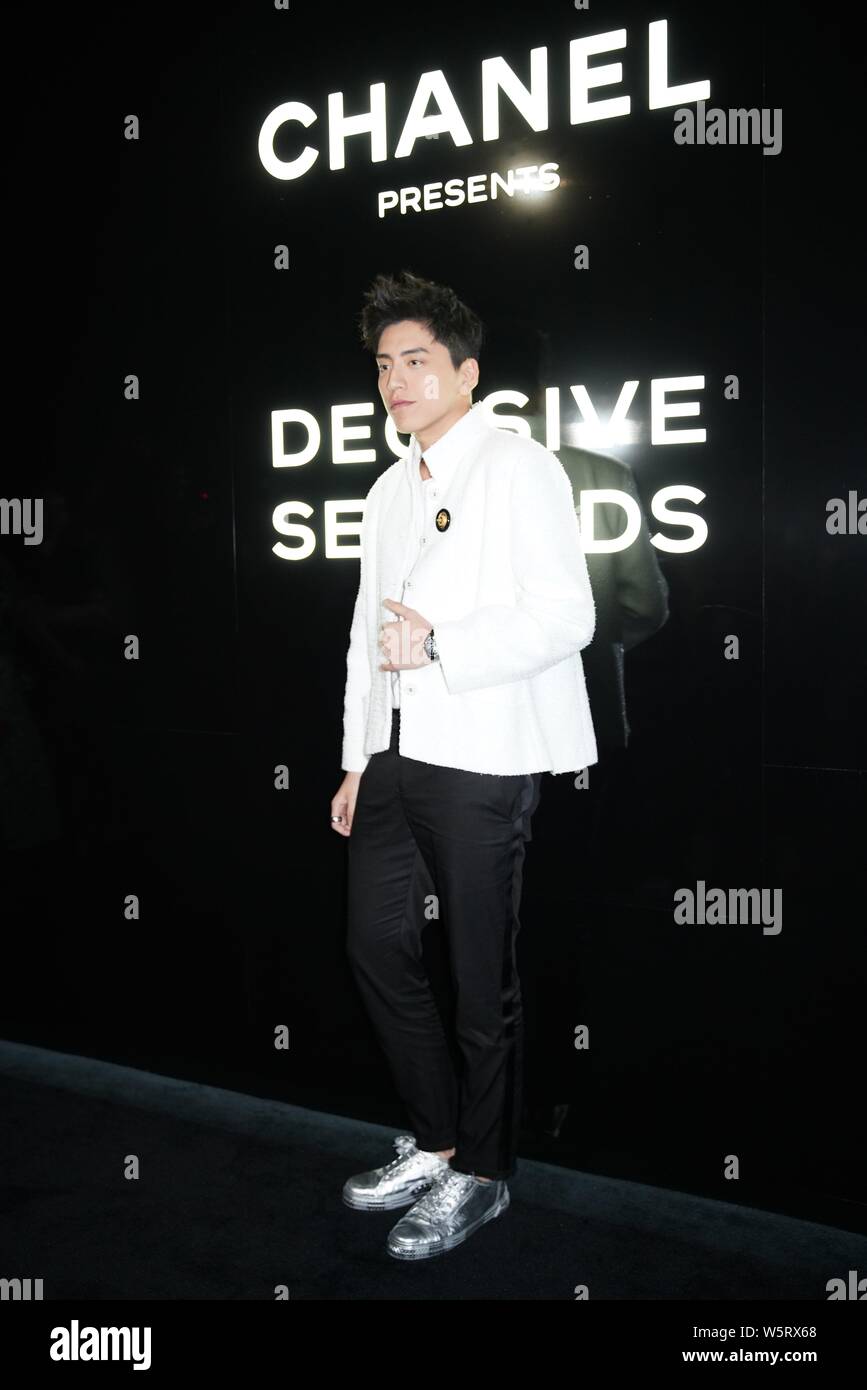 Taiwanese actor Darren Wang attends the opening ceremony for Chanel J12 ...
