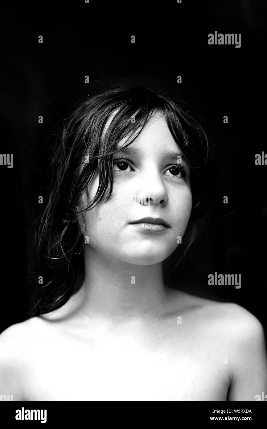 Portrait of ten year old boy with long hair Stock Photo - Alamy