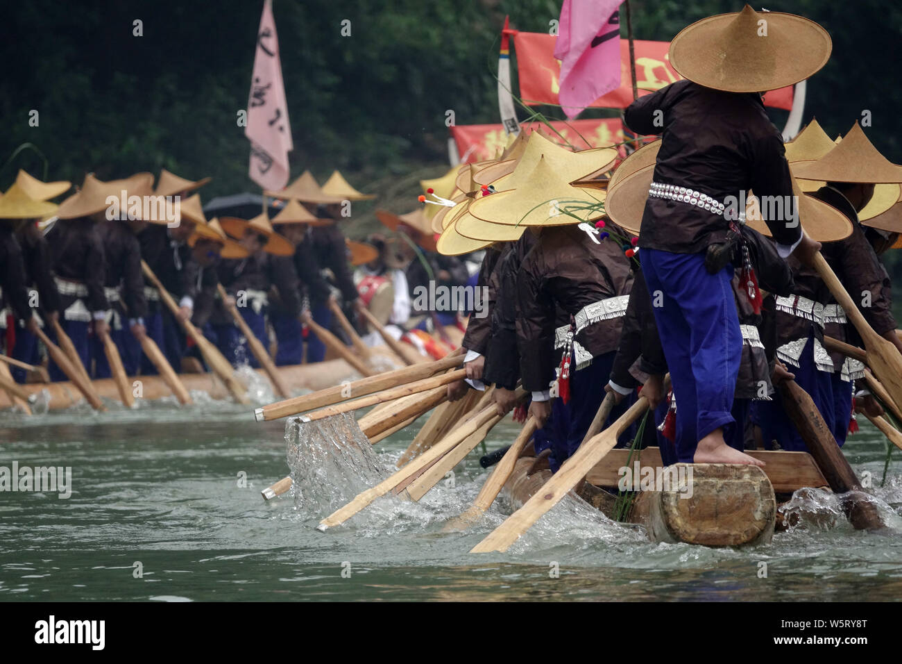 Chinese people of Miao ethnic minority take part in a dragon race ...