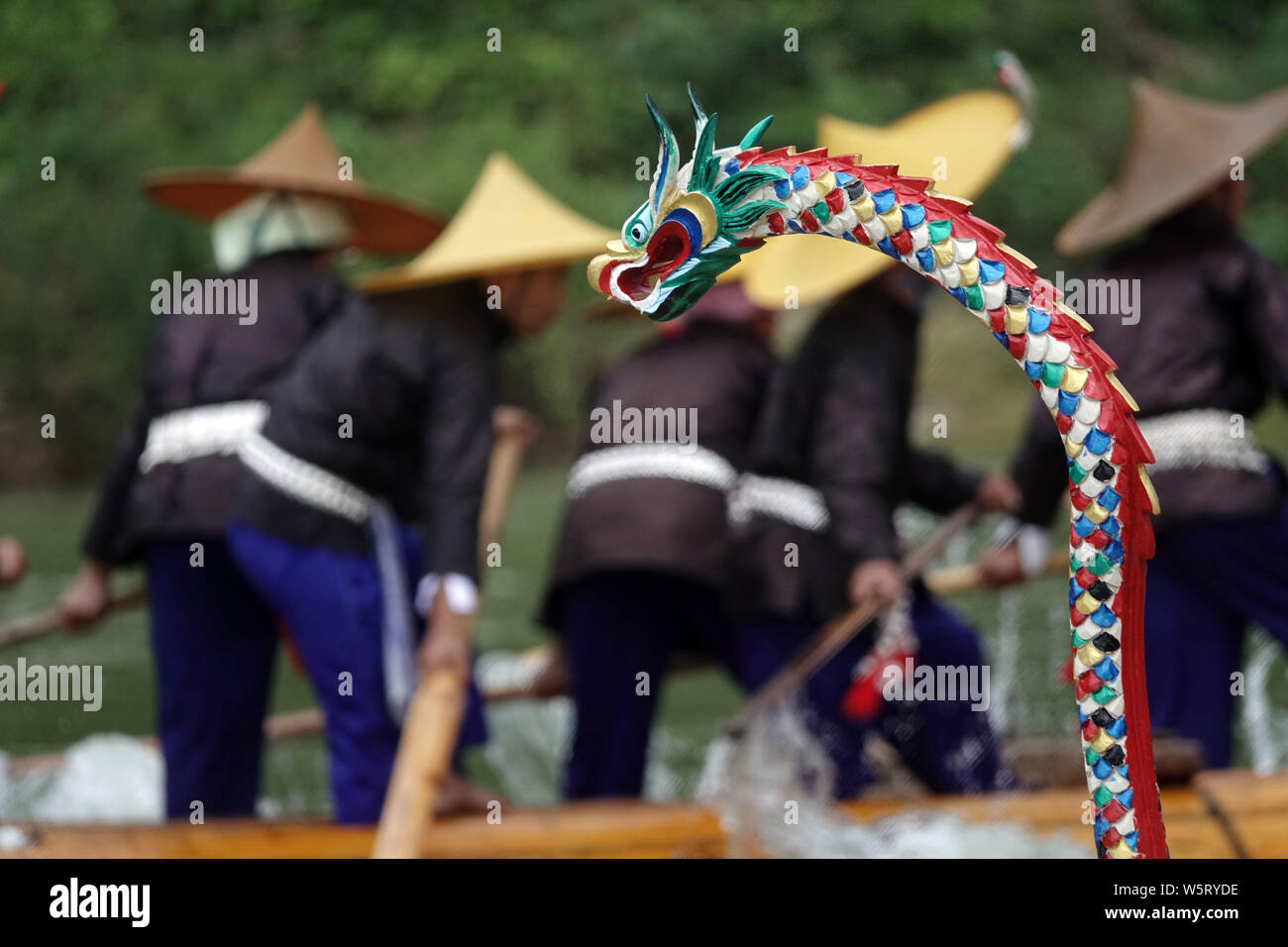 Chinese people of Miao ethnic minority take part in a dragon race ...