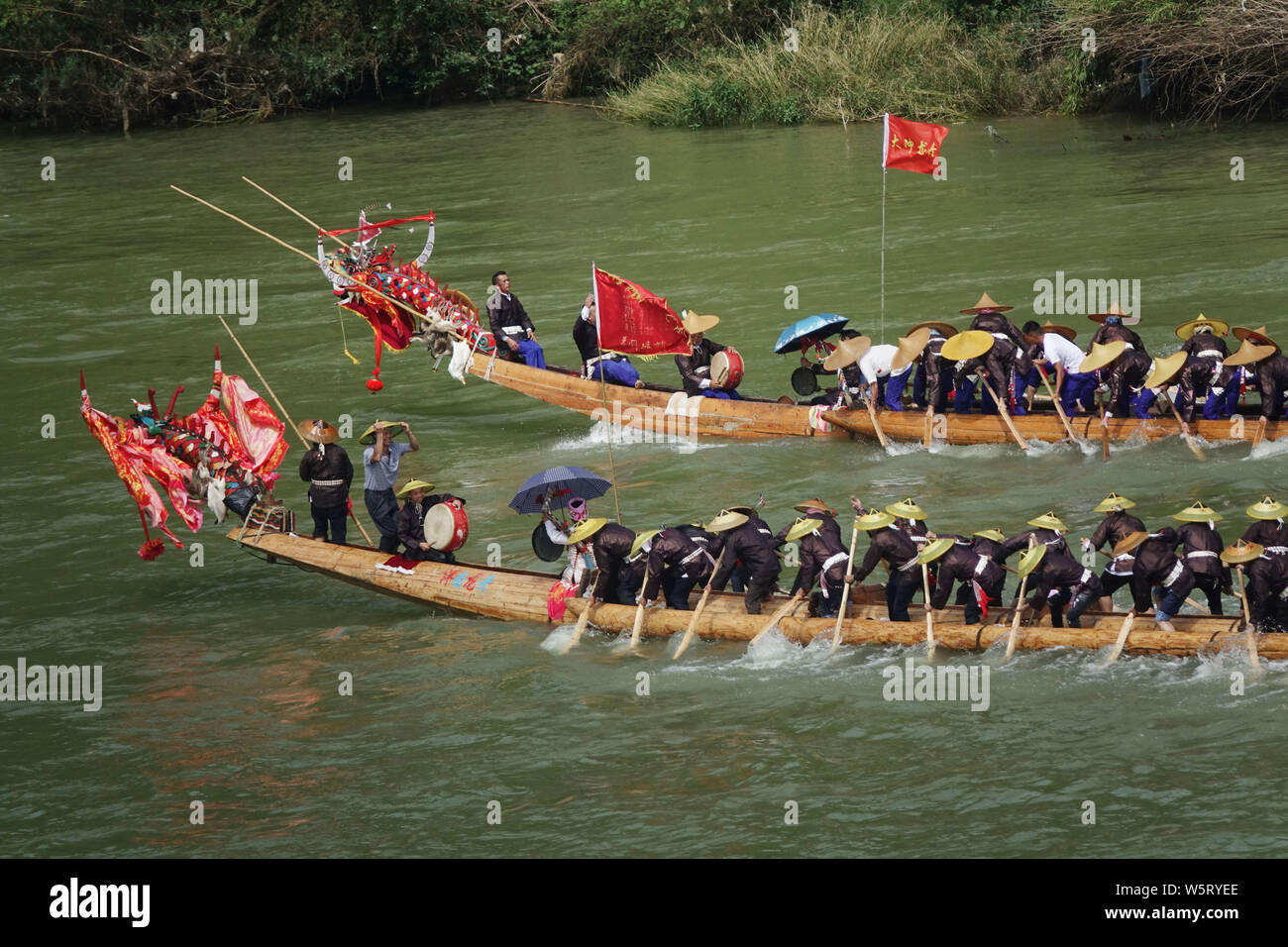 Chinese people of Miao ethnic minority take part in a dragon race ...